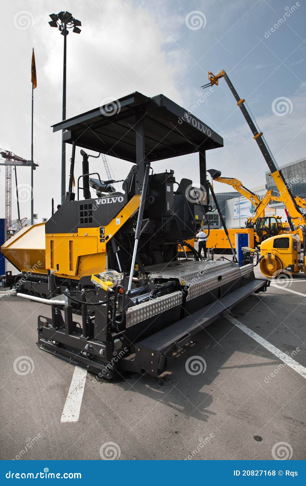 Yellow asphalt spreader editorial stock photo. Image of construction ...
