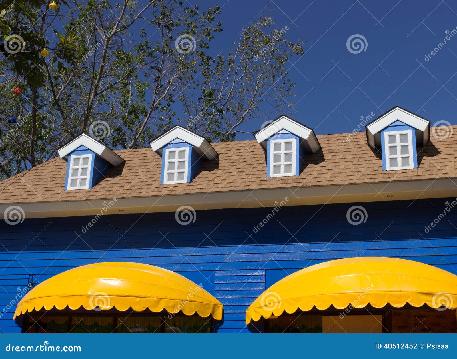 Yellow Awning and Blue Window Shop Stock Photo - Image of consumerism ...