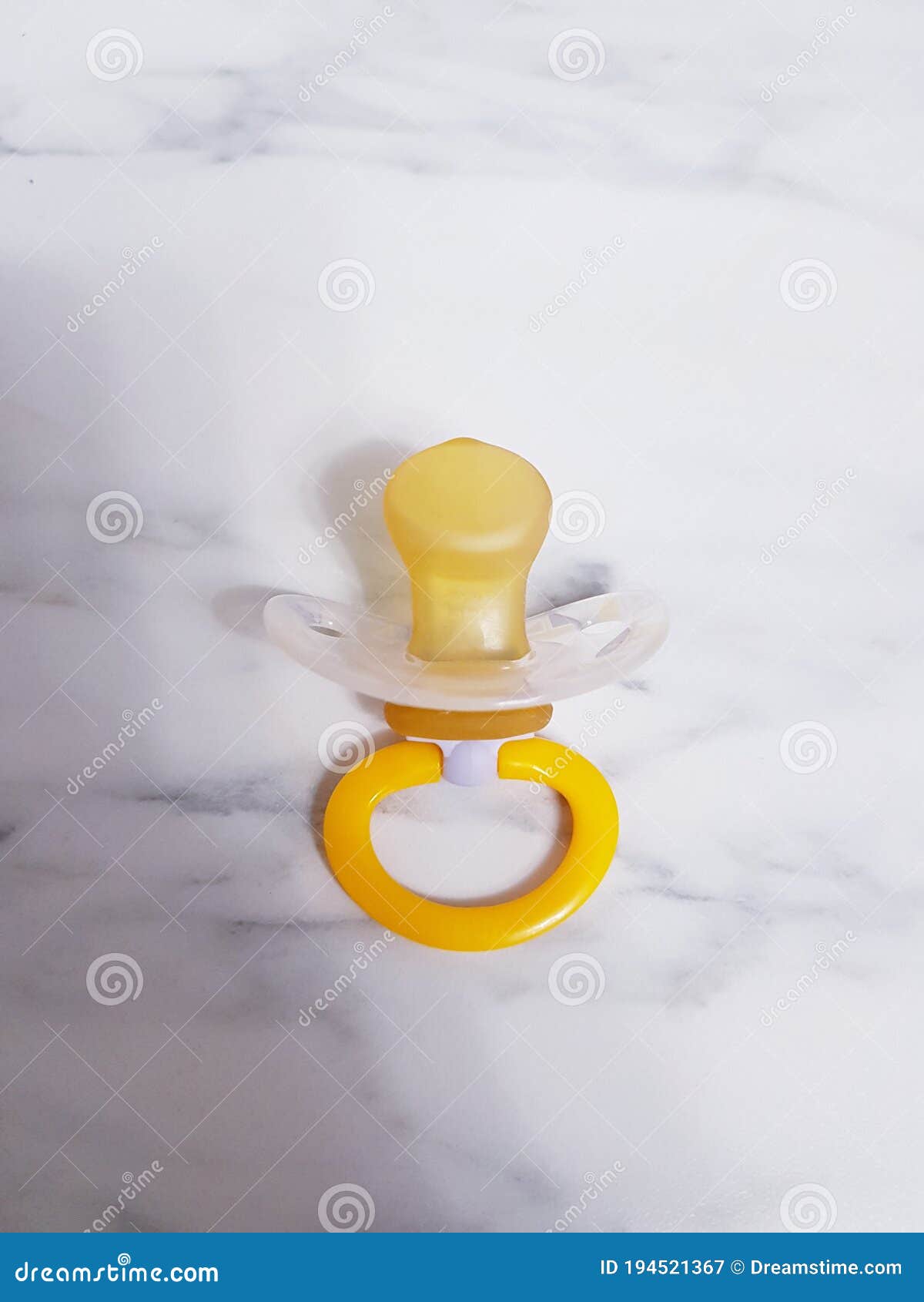Yellow baby pacifier stock image. Image of rubber, isolated - 194521367