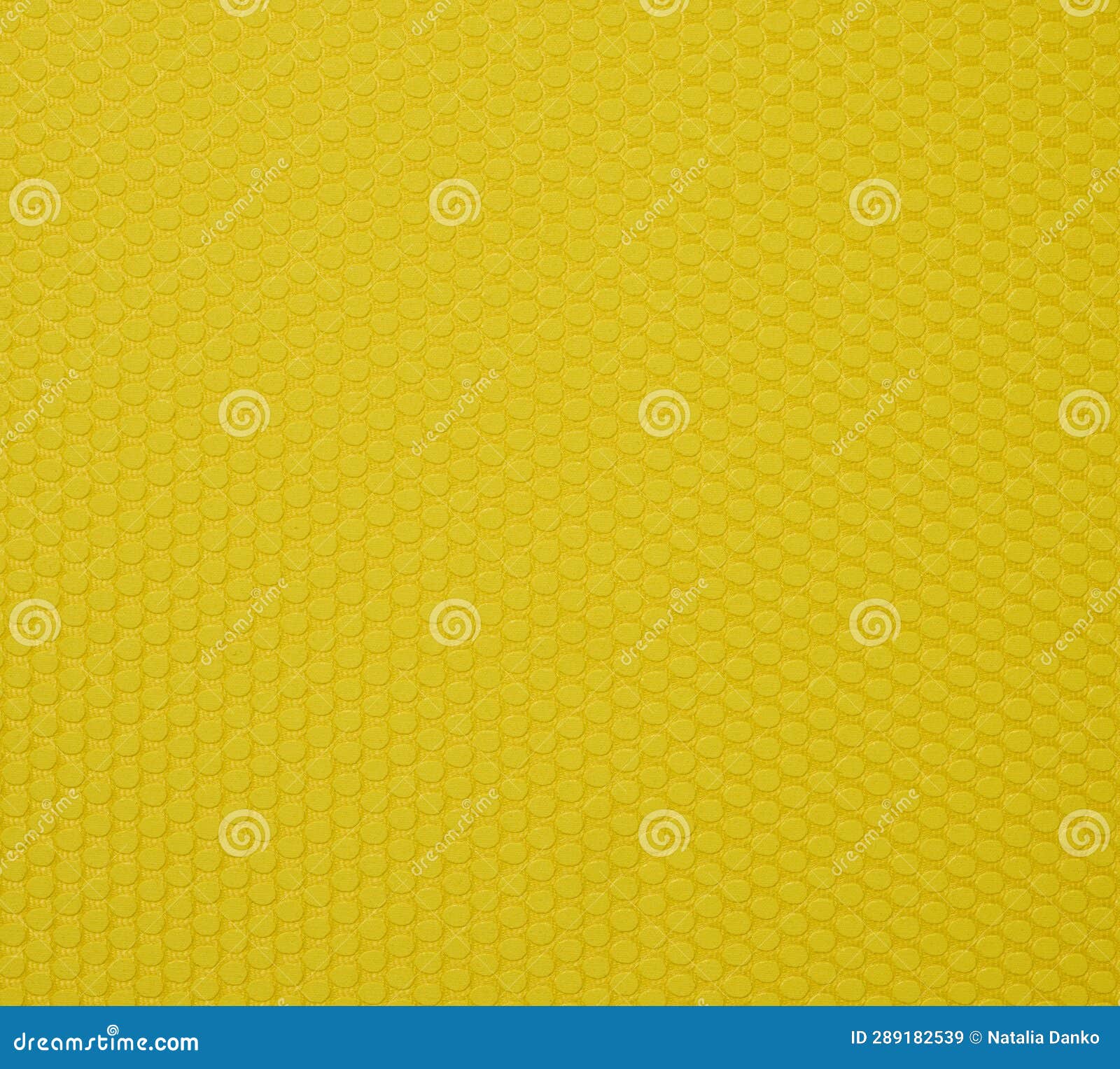 A Yellow Background Texture Made Up of Small Hexagons that are Slightly ...