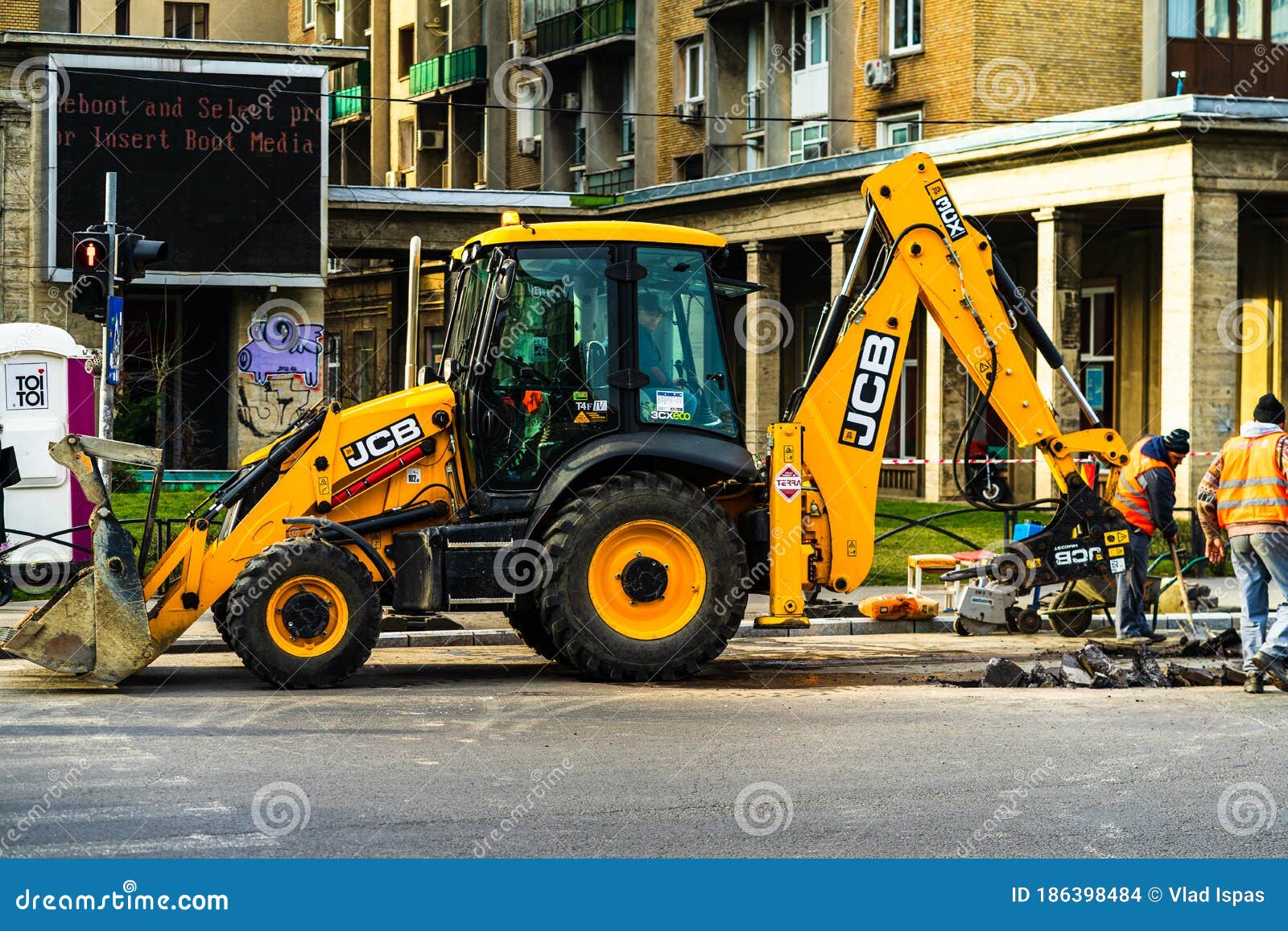 Yellow Backhoe Loader on Construction Site Ready for Working in ...