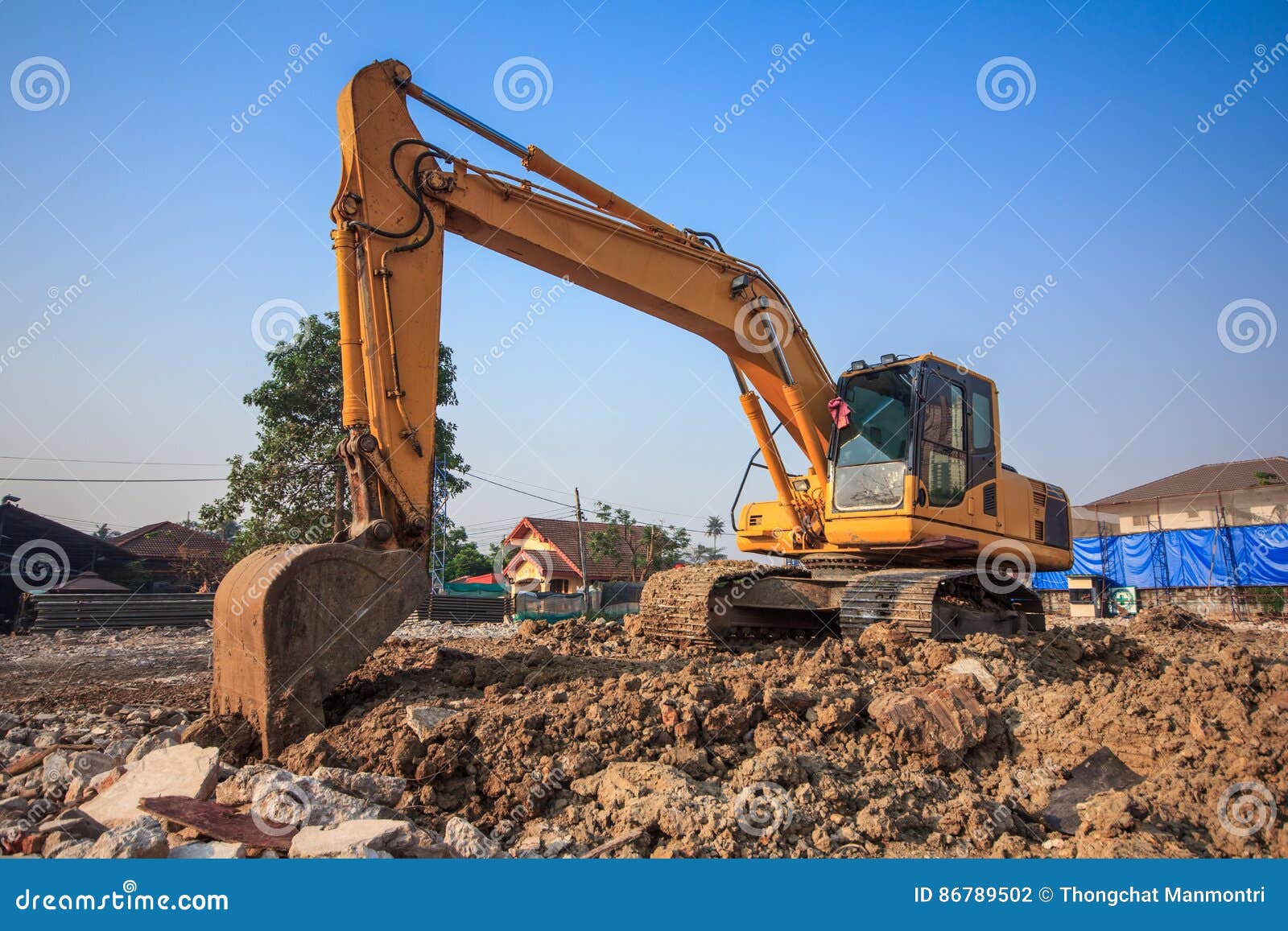 Yellow Backhoe Loader on Construction Site and Work Stock Photo - Image ...