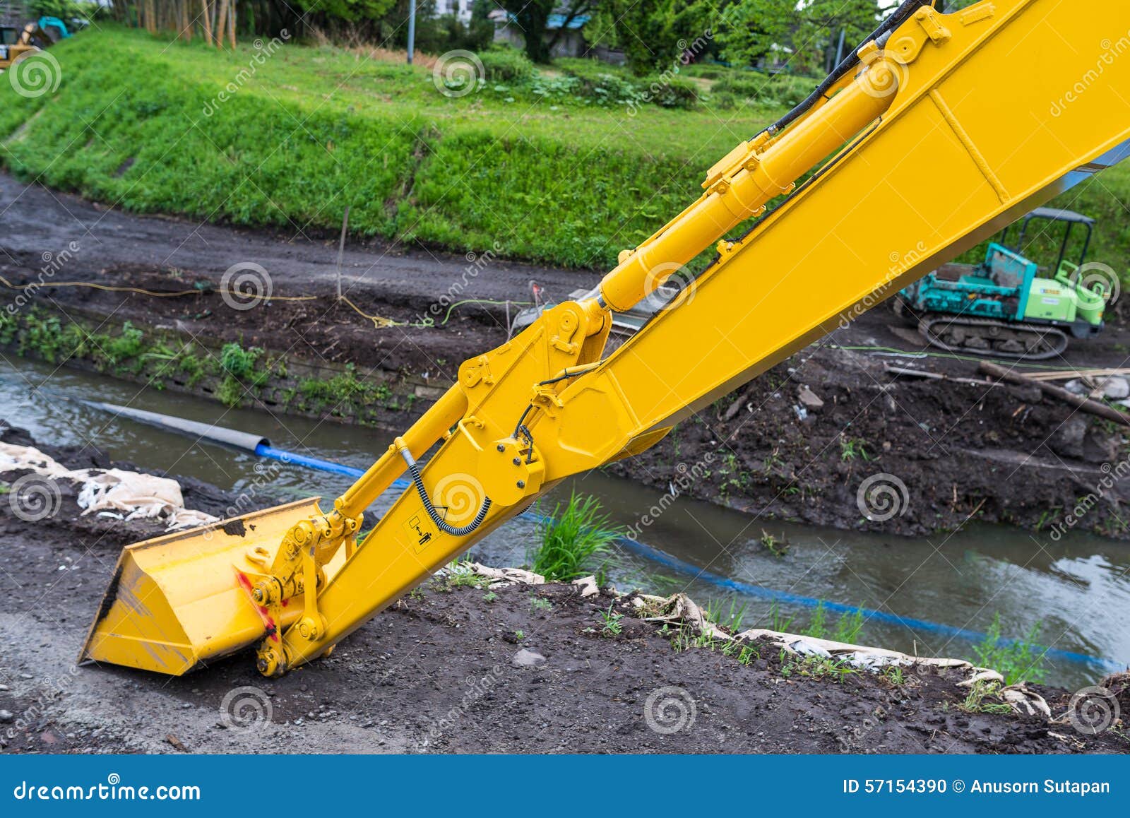 Yellow Backhoe Loader Making Canal for Flooding Prevention Stock Photo ...