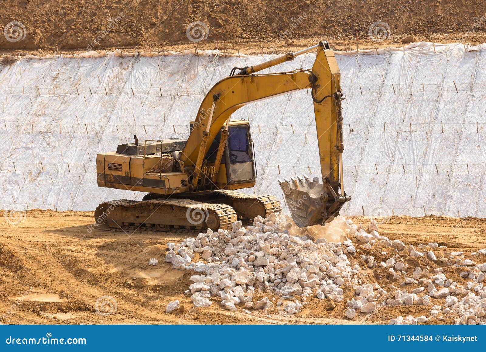 Yellow Backhoe Work in the Dam Stock Photo - Image of scoop, heavy ...