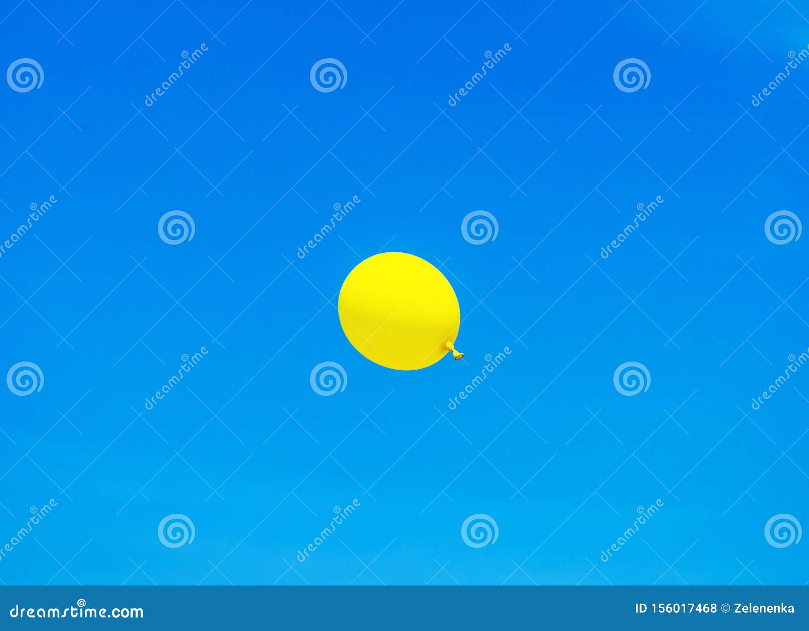 Yellow Balloon Flying into Sunny Blue Sky Stock Photo - Image of helium ...