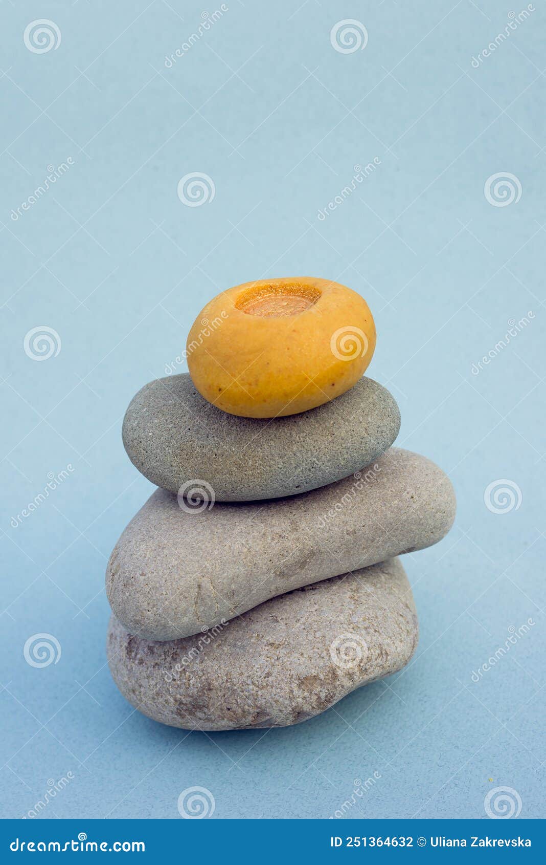 Yellow Bar of Solid Shampoo on Top of Smooth Pebbles Stack on Light ...
