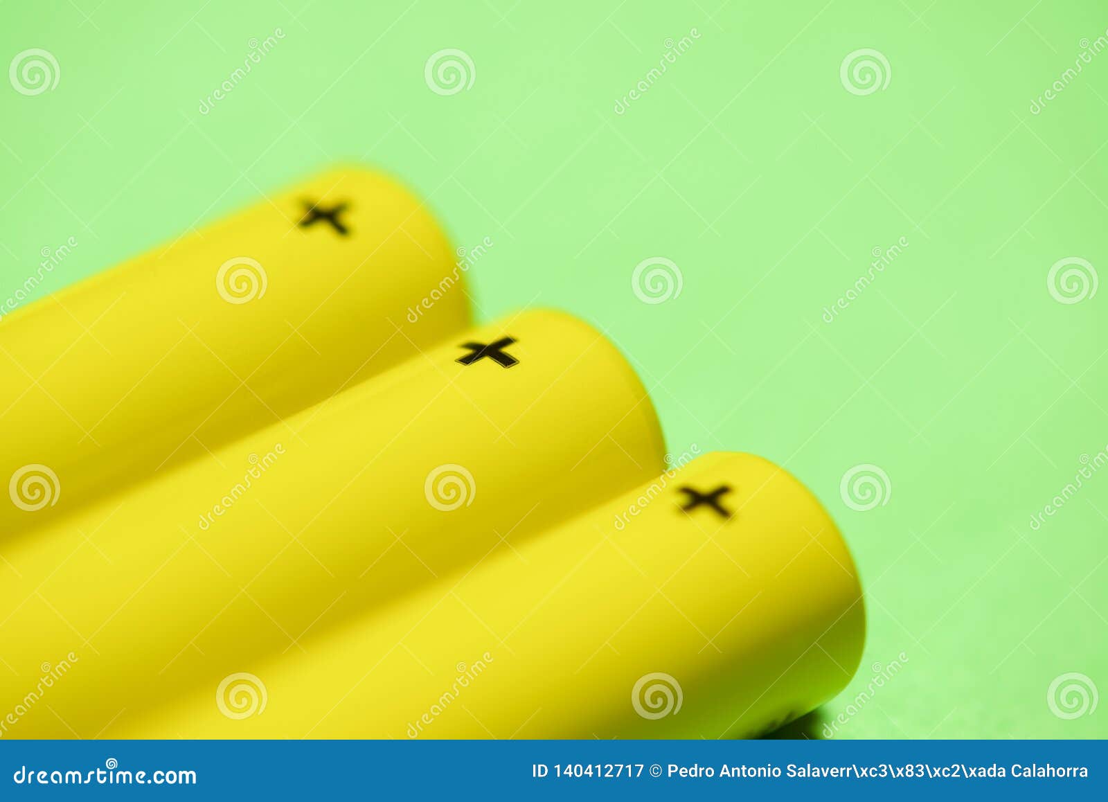 Yellow batteries view stock image. Image of plus, negative - 140412717