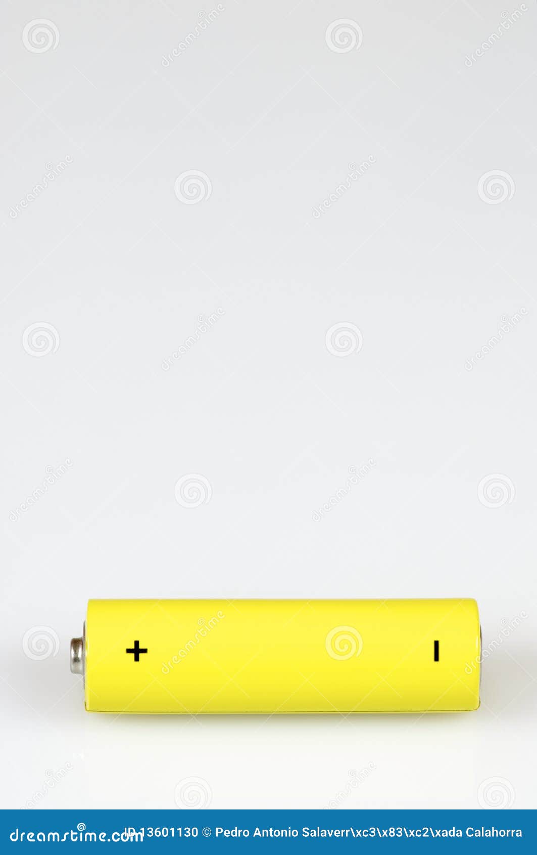 Yellow battery stock photo. Image of plus, macro, electrical - 13601130