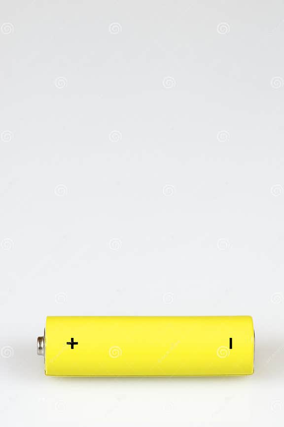 Yellow battery stock photo. Image of plus, macro, electrical - 13601130