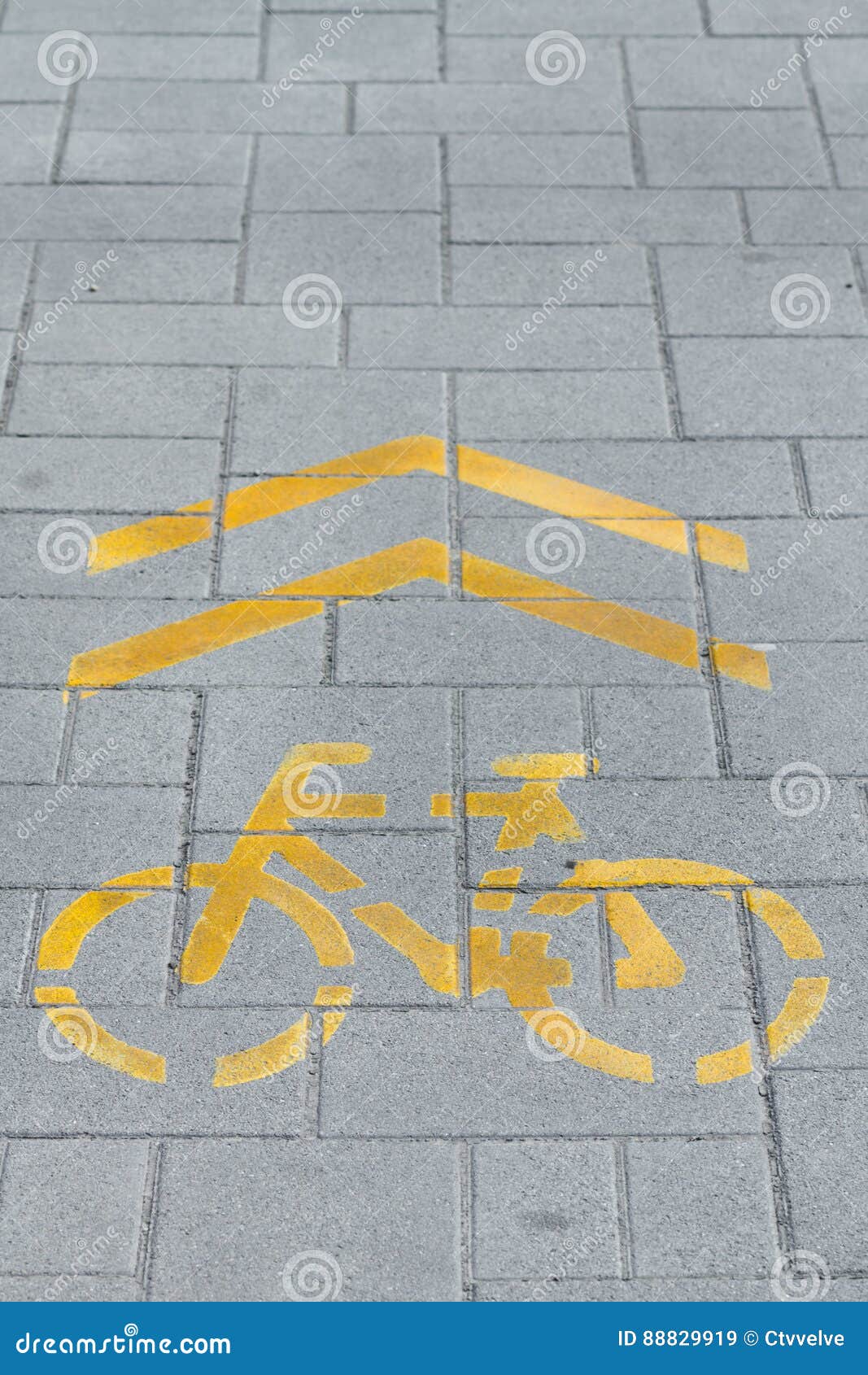 Yellow bicycle road sign stock image. Image of path, pavement - 88829919