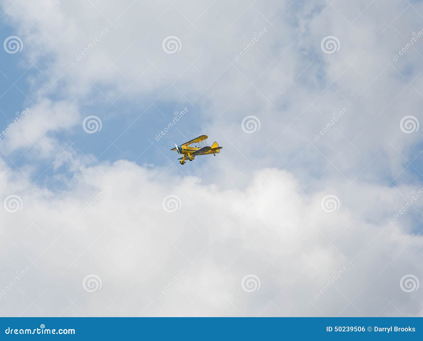 Yellow Biplane in flight stock photo. Image of plane - 50239506
