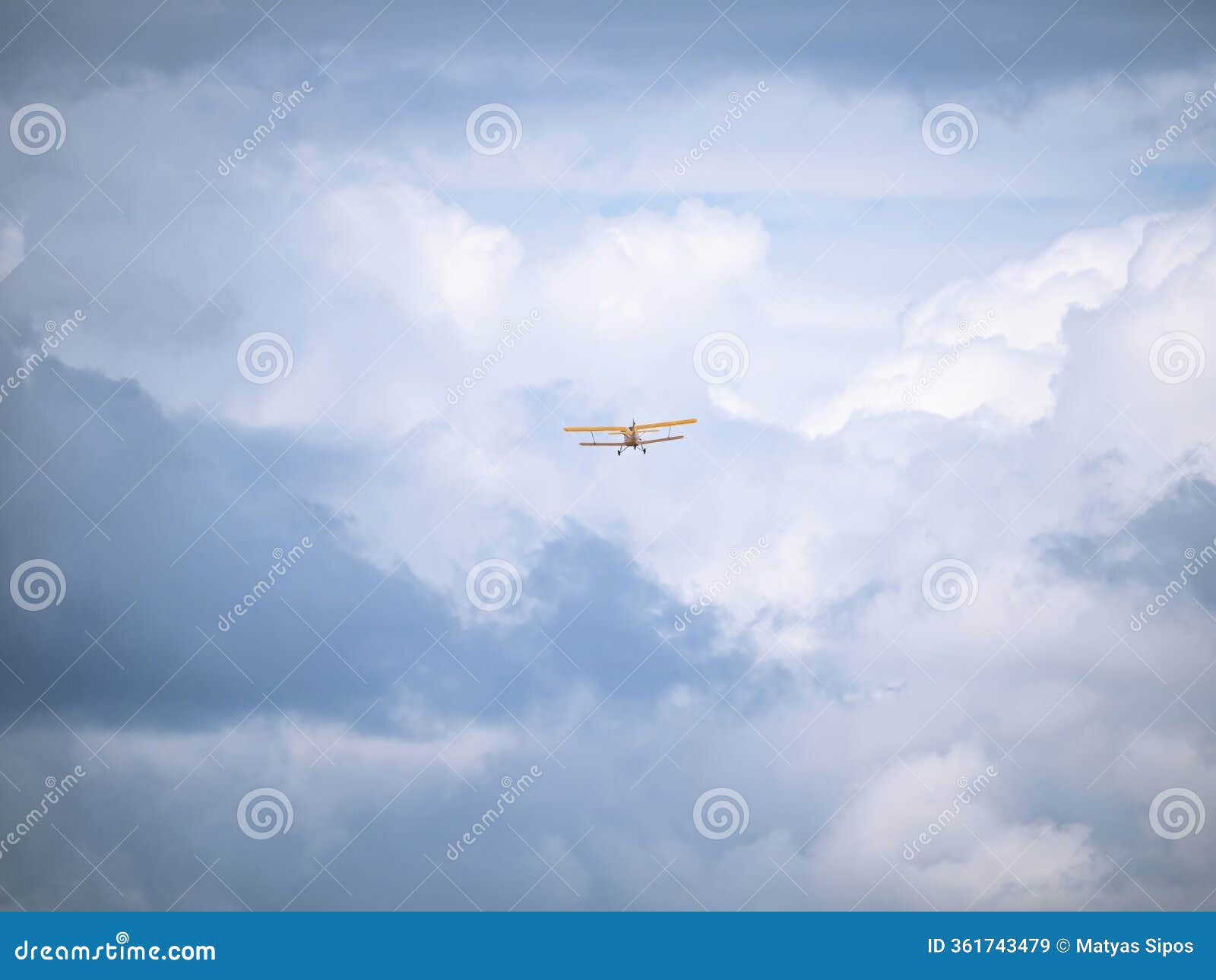 Yellow Biplane Flying High among Clouds Stock Image - Image of biplane ...