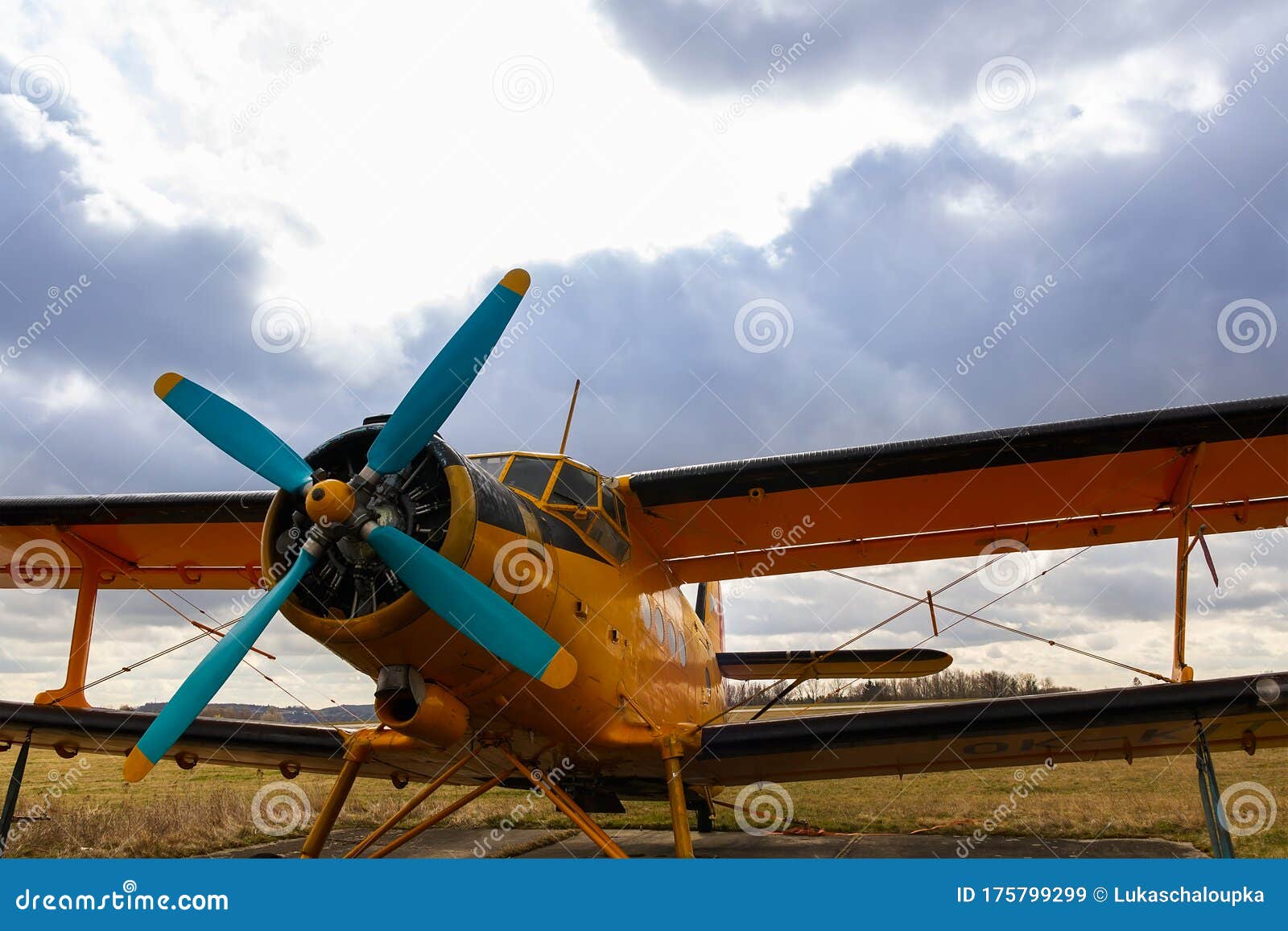 Yellow Biplane from Front Standing on Airports with Cloud Sky Stock ...