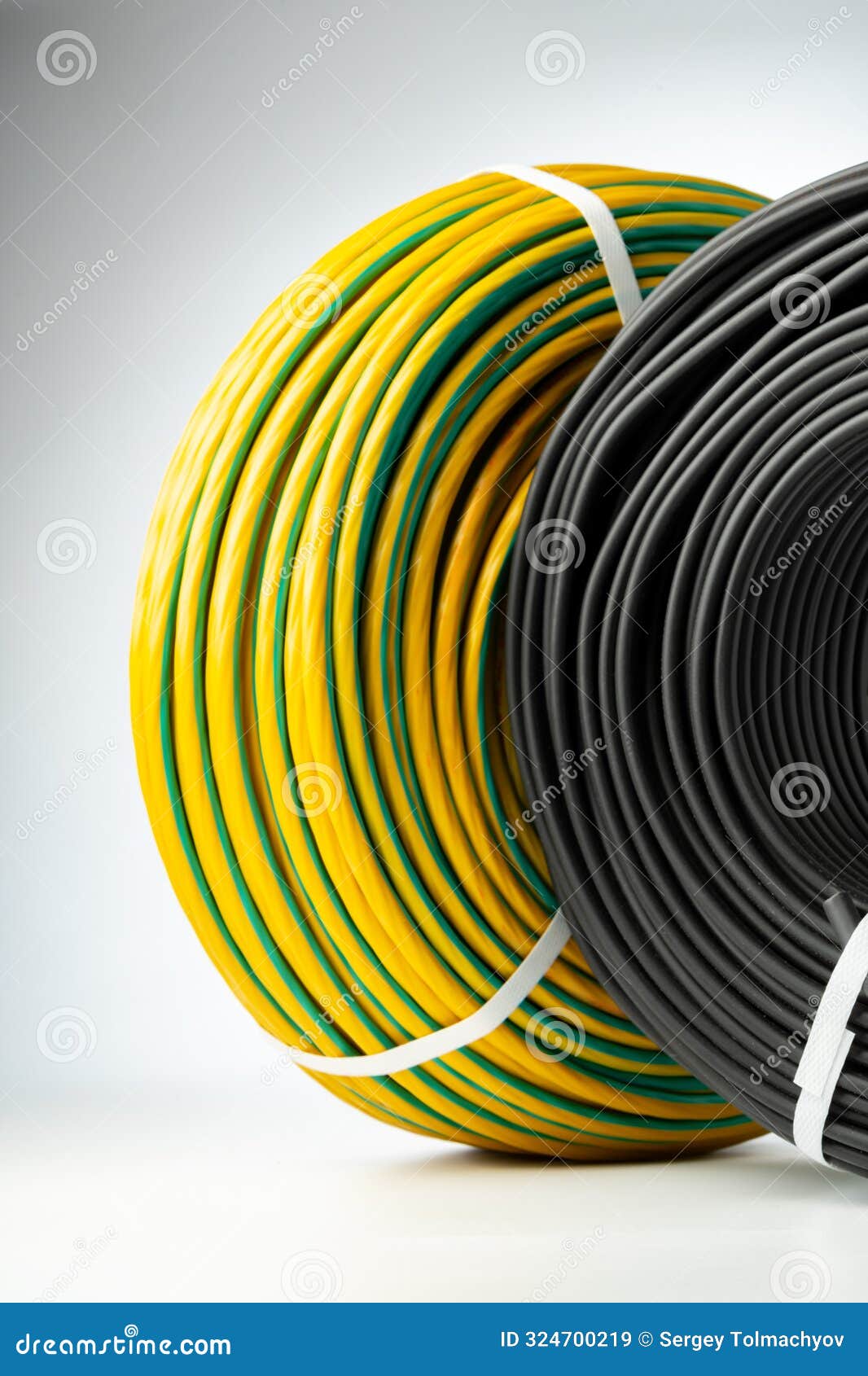 Yellow and Black Electrical Wire Spools Isolated on White Background ...