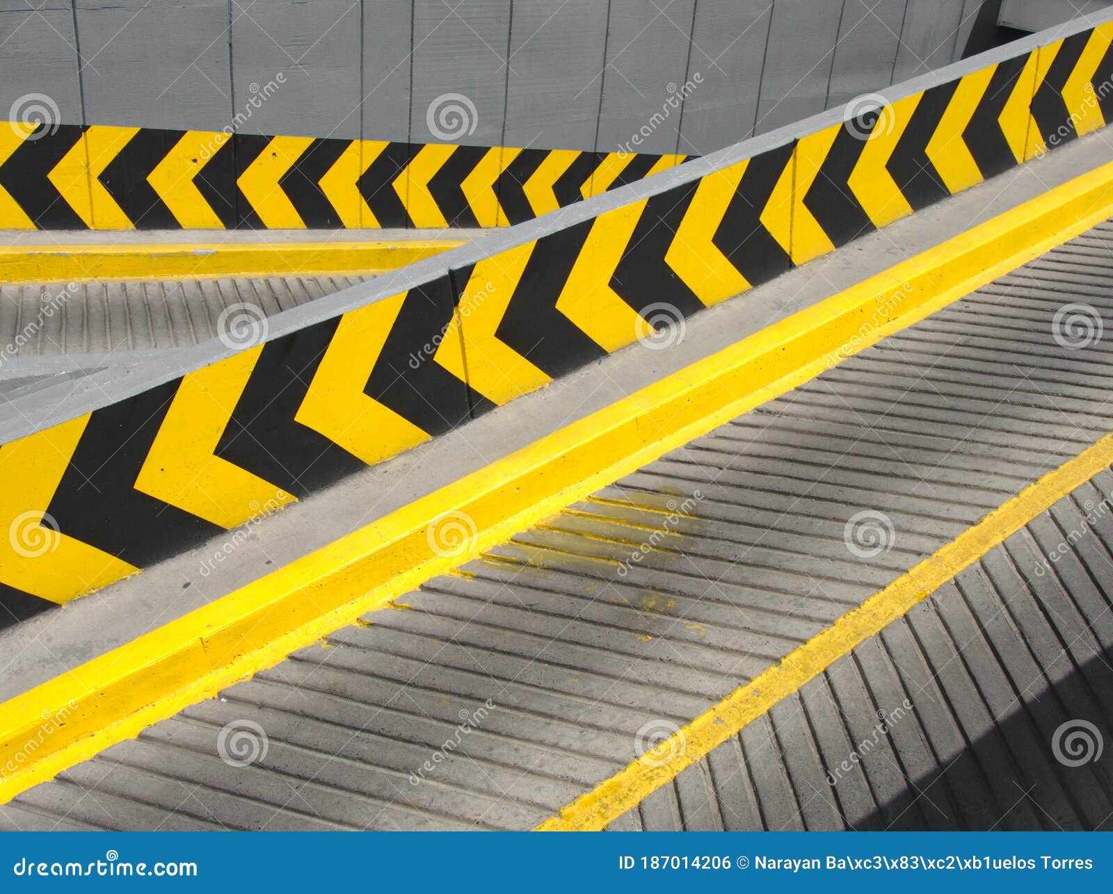 Yellow and Black Traffic Paint in Parking Lot Stock Photo - Image of ...
