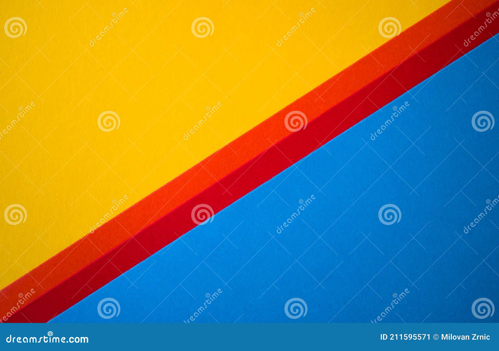 Yellow and Blue Colored Paper Background Divided Diagonally Stock Image ...