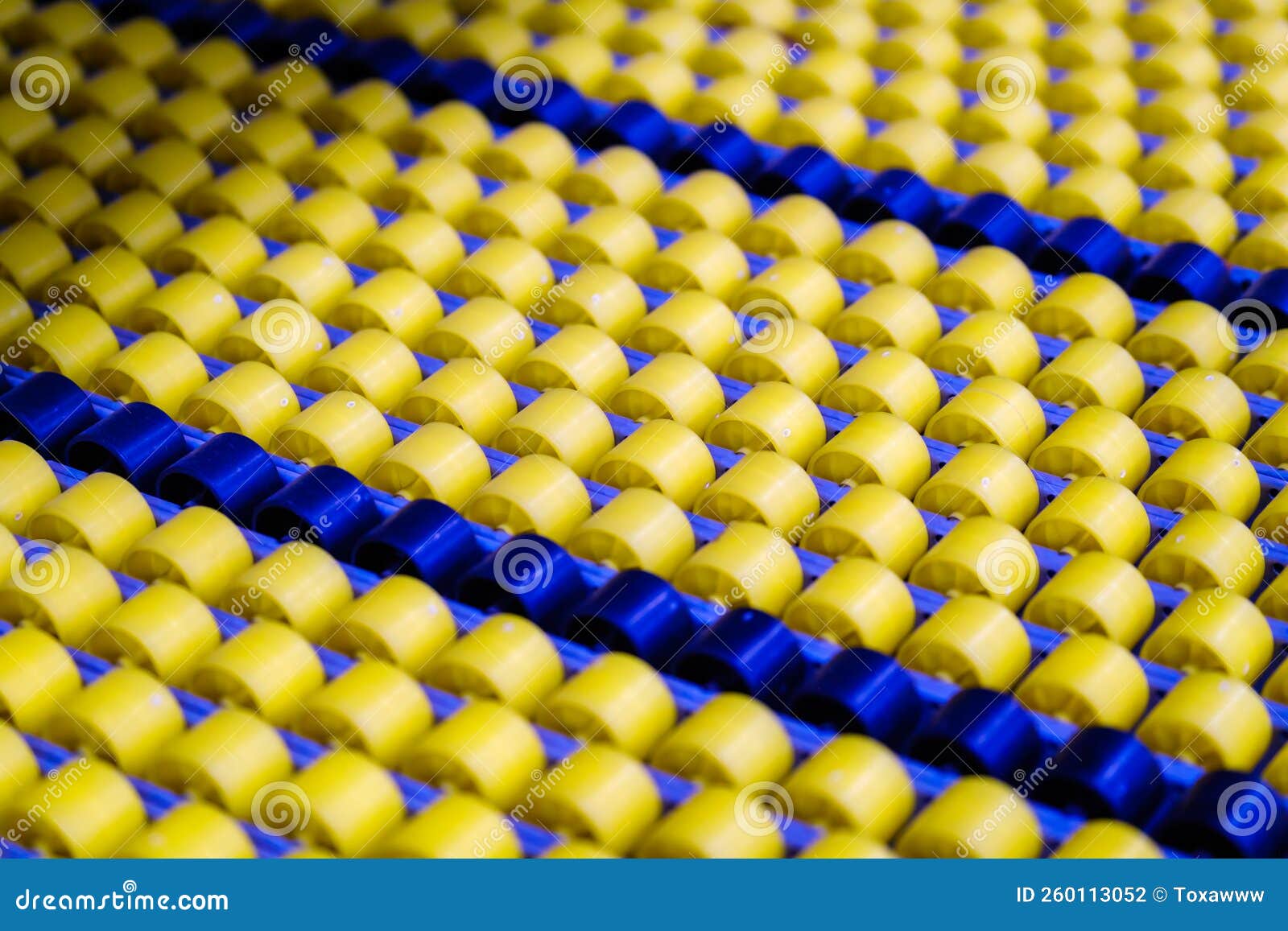 Yellow and Blue Conveyor Rollers Stock Photo - Image of vibrant ...