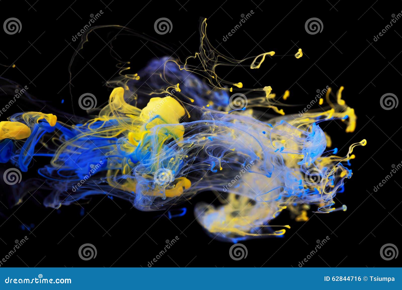 Yellow and Blue Ink in Water Stock Photo - Image of liquid, background ...