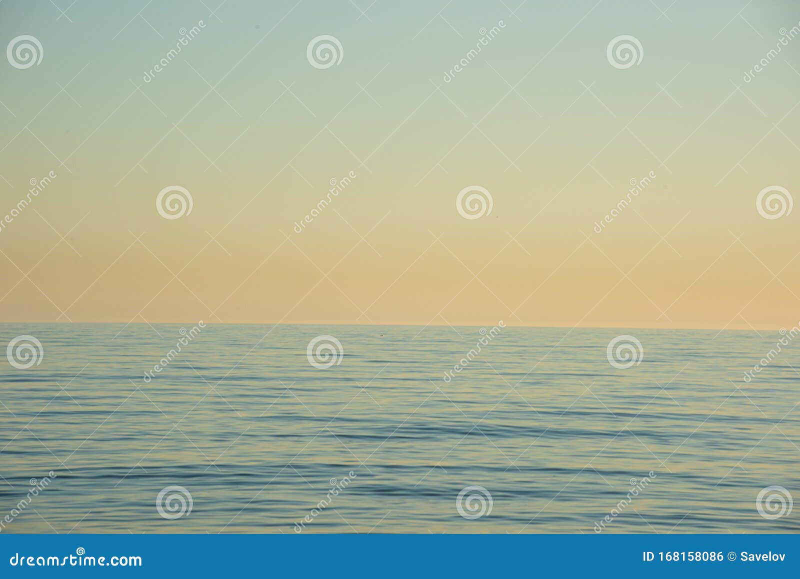 Yellow and Blue Landscape with the Sea during Sunset Stock Photo ...
