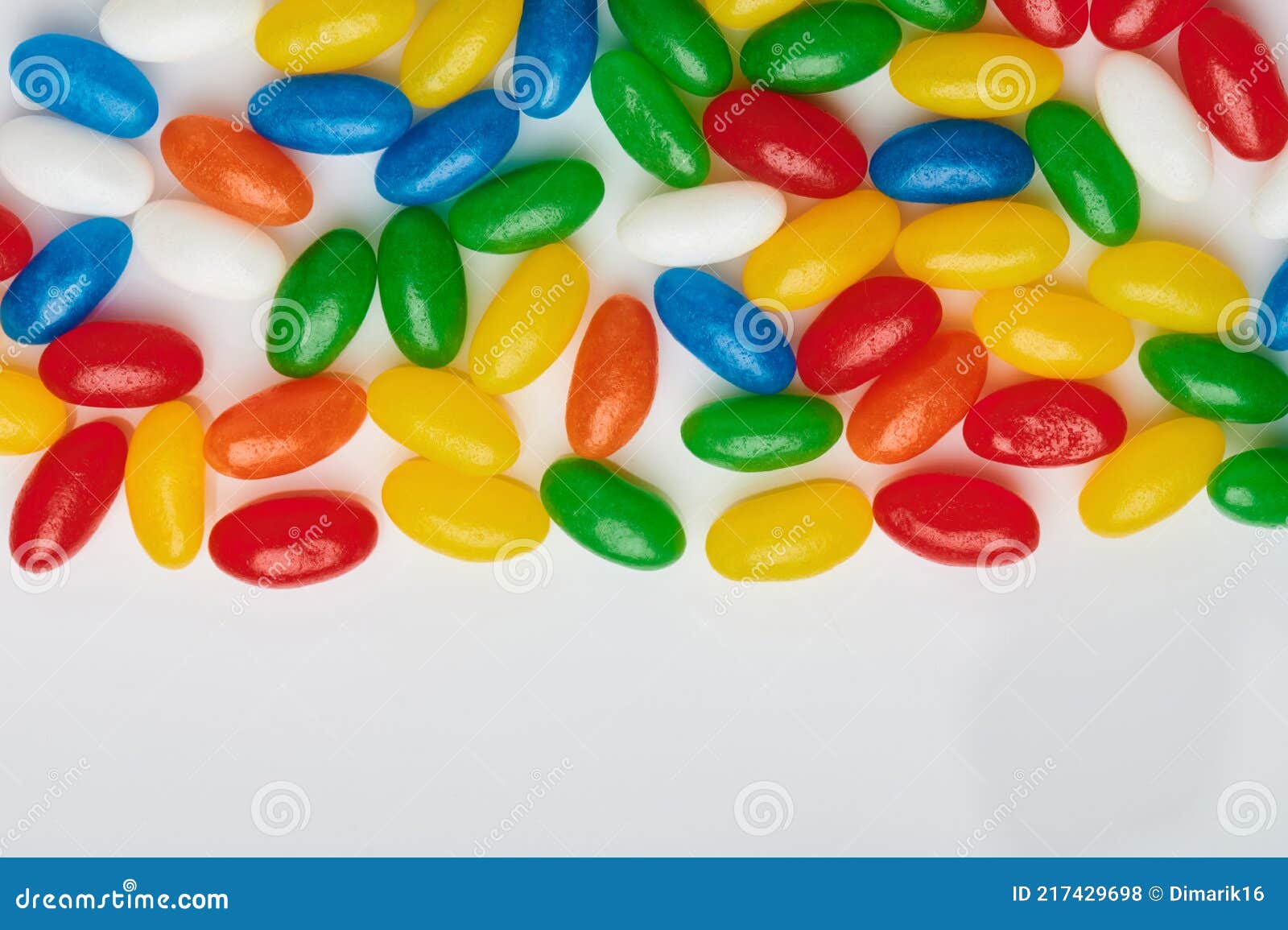 Yellow and blue oval candy stock photo. Image of color - 217429698