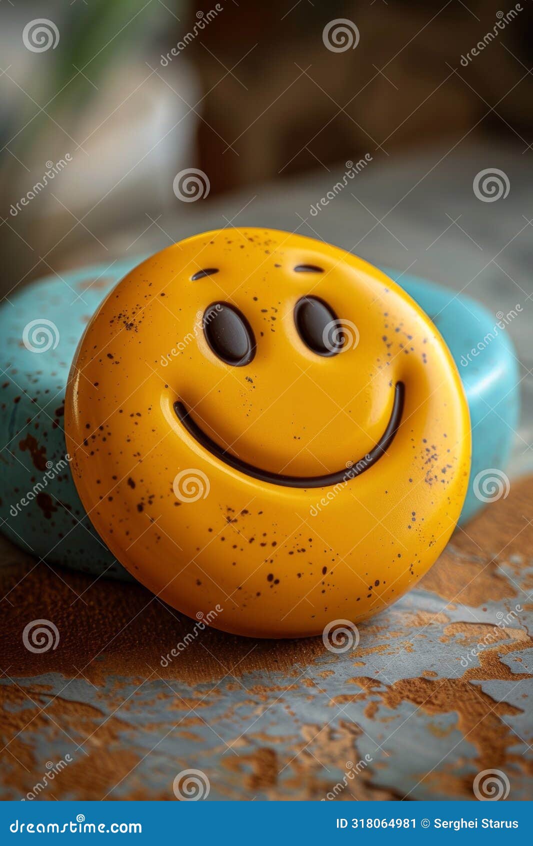 A Yellow and Blue Smiley Face Cookie Sitting on Top of a Table, AI ...