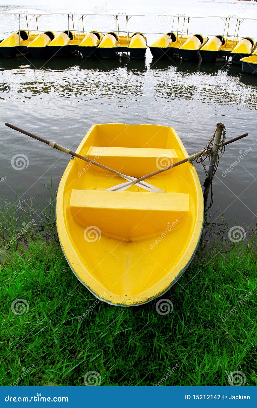 Yellow boat stock photo. Image of paddle, action, water - 15212142