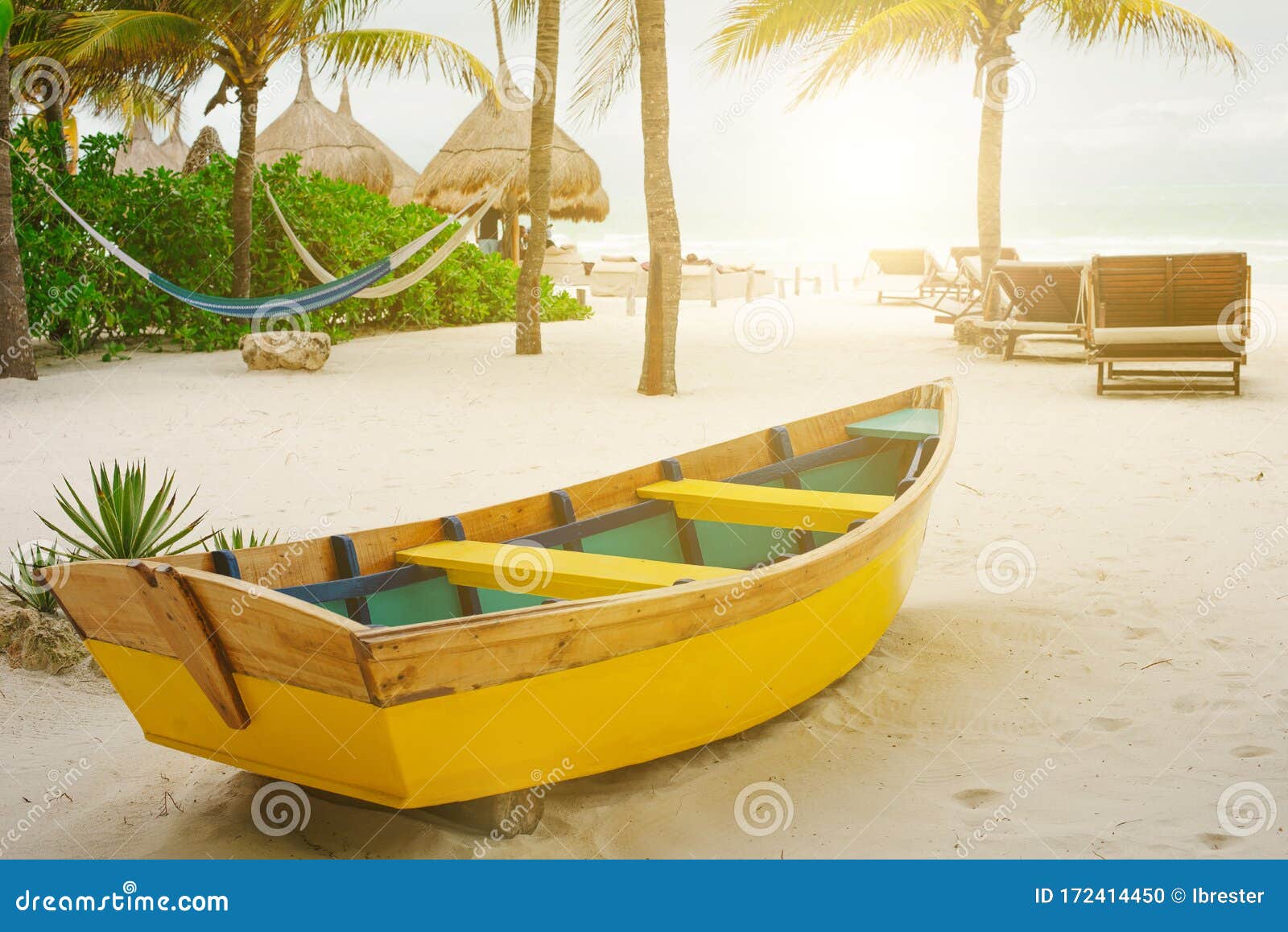Yellow boat on the beach stock photo. Image of yellow - 172414450