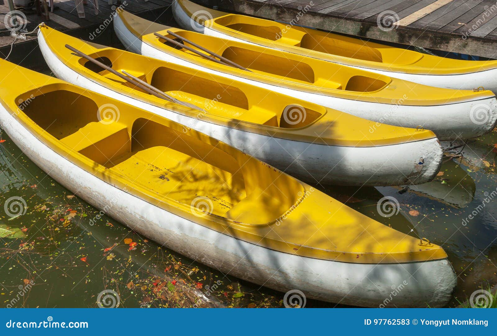 Yellow Boat Rowing stock image. Image of vessel, kayak - 97762583
