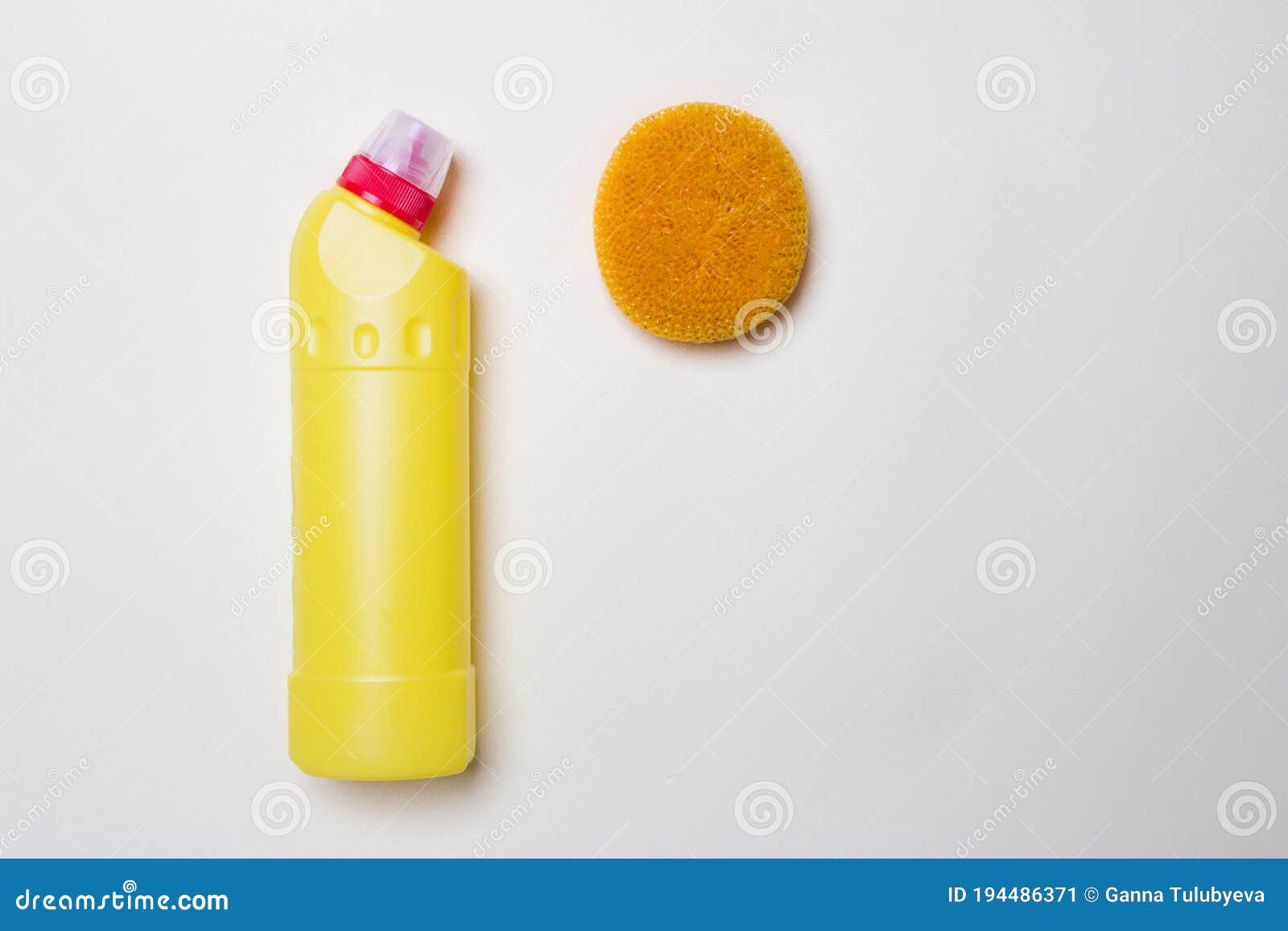 Yellow Bottle with Cleaning Agent and Scrubber on White Background Top ...
