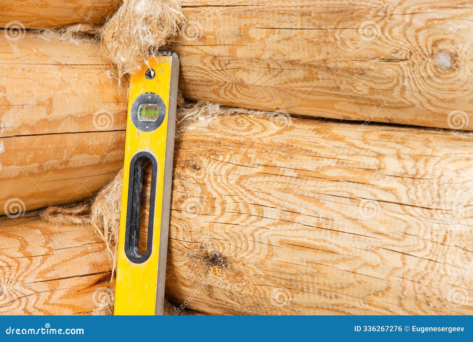 Yellow Box Beam Level Stands in the Corner of New Log House Stock Photo ...