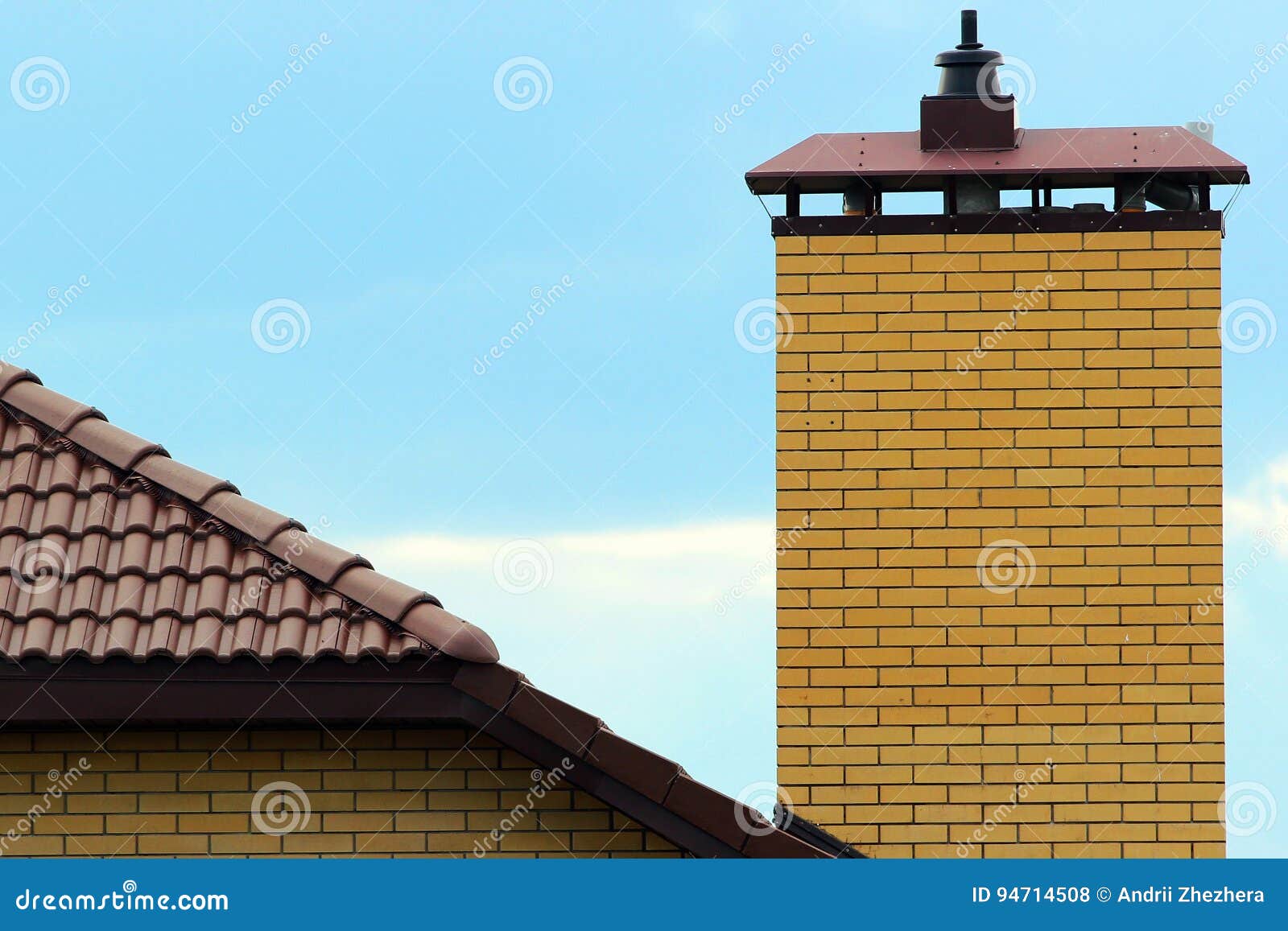 Yellow Brick Chimney on Blue Sky Background Stock Photo - Image of ...