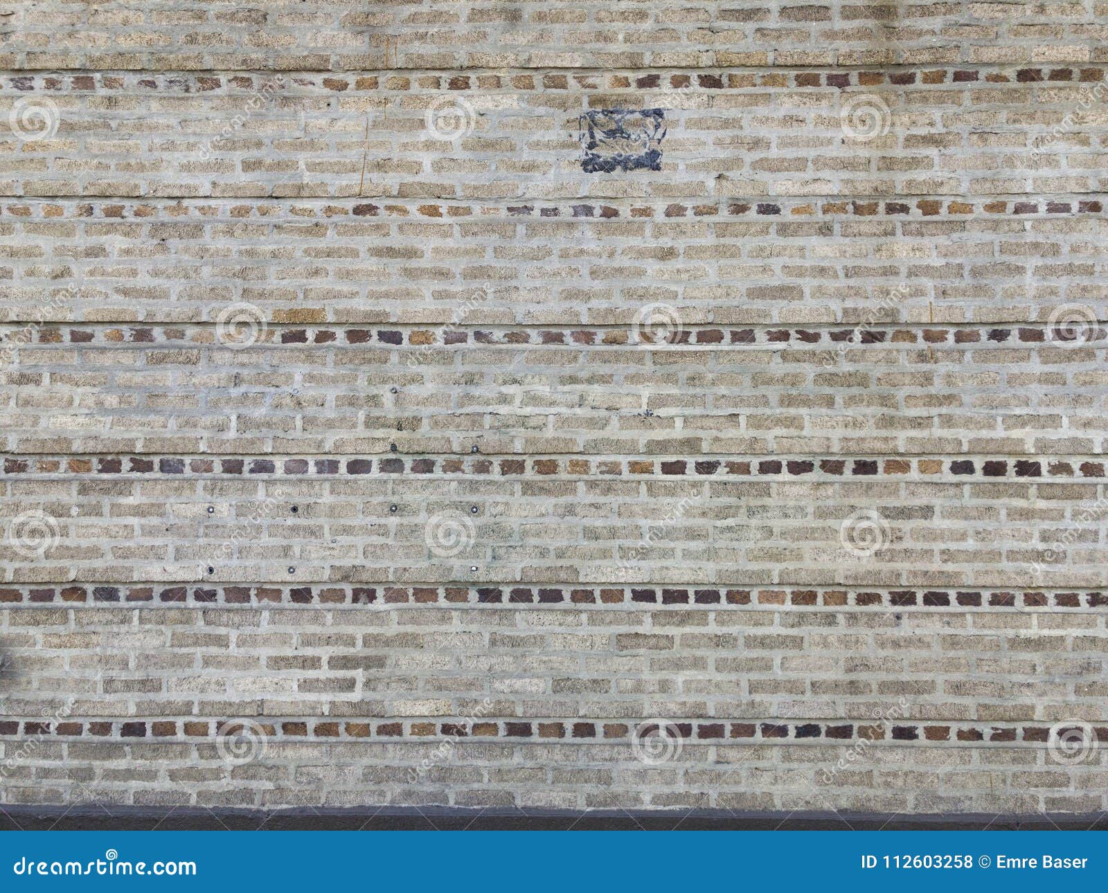 Yellow Brick Wall with Lines of Red Bricks Stock Photo - Image of ...