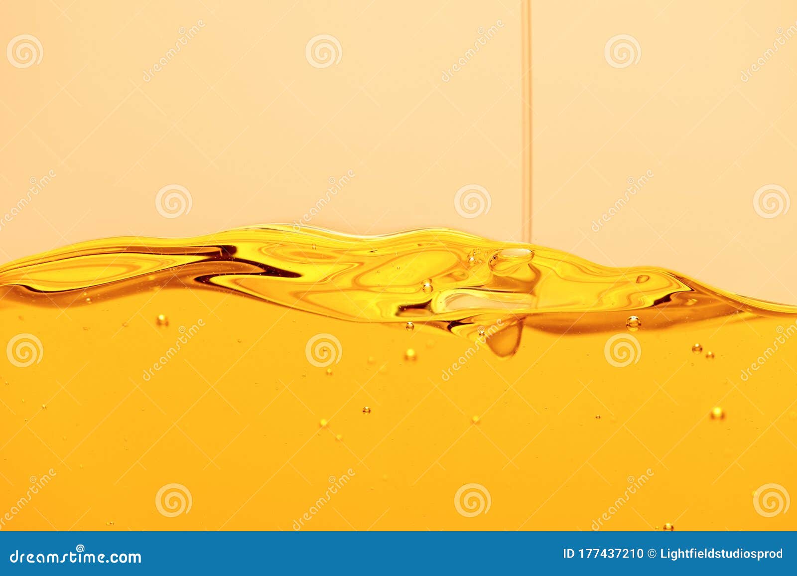Yellow Bright Liquid Stream with Bubbles Stock Photo - Image of bubbles ...