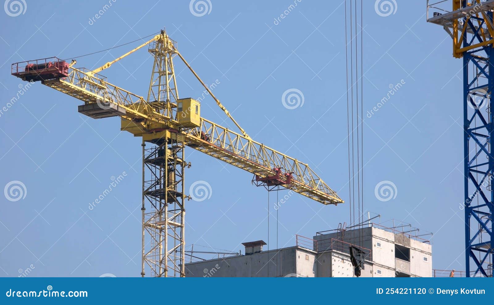 Yellow Building Crane on Construction Site. Stock Photo - Image of ...