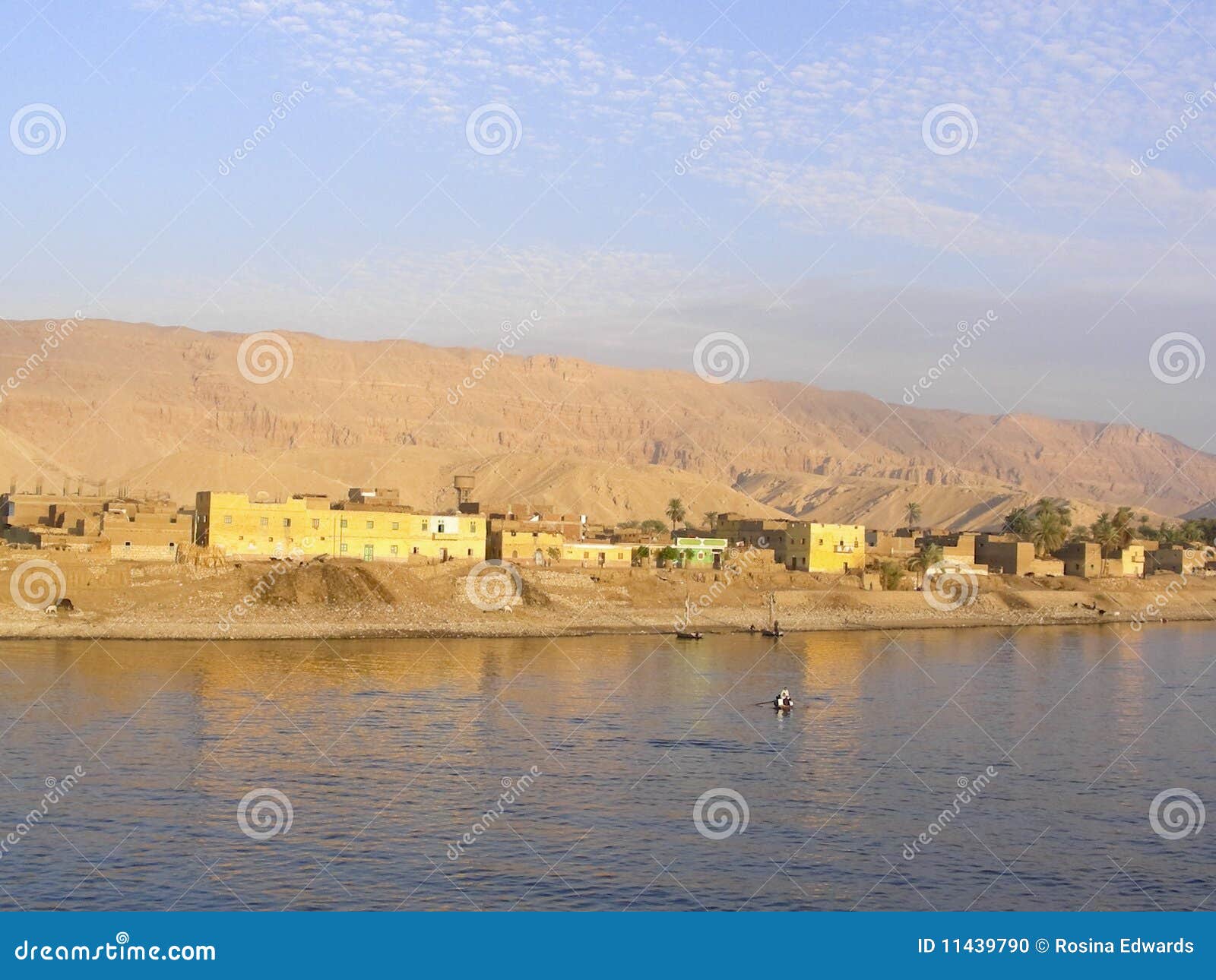 Yellow Building on the Nile Stock Photo - Image of buildings, water ...