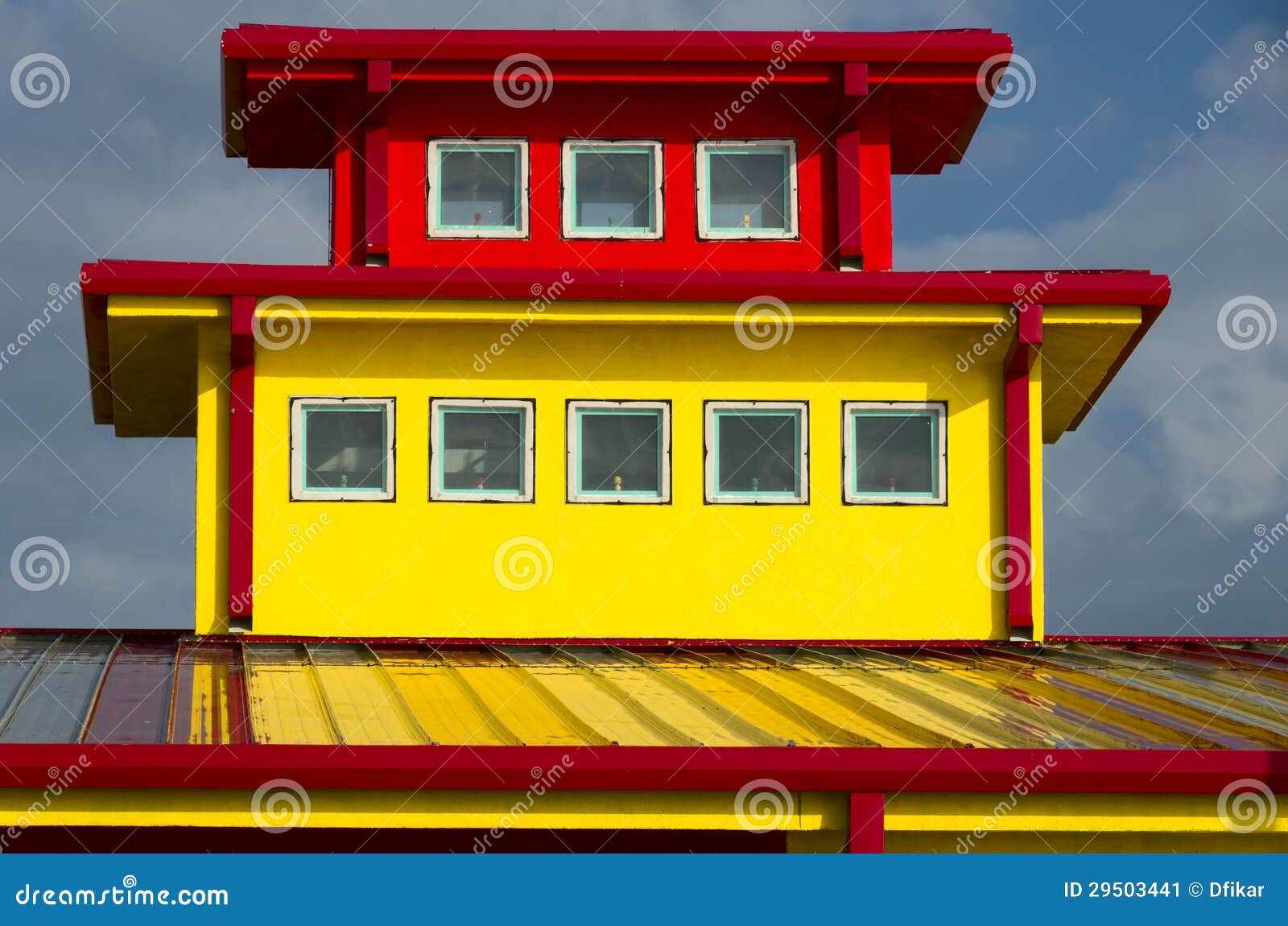 Yellow Building with Red Trim Stock Image - Image of metal, front: 29503441