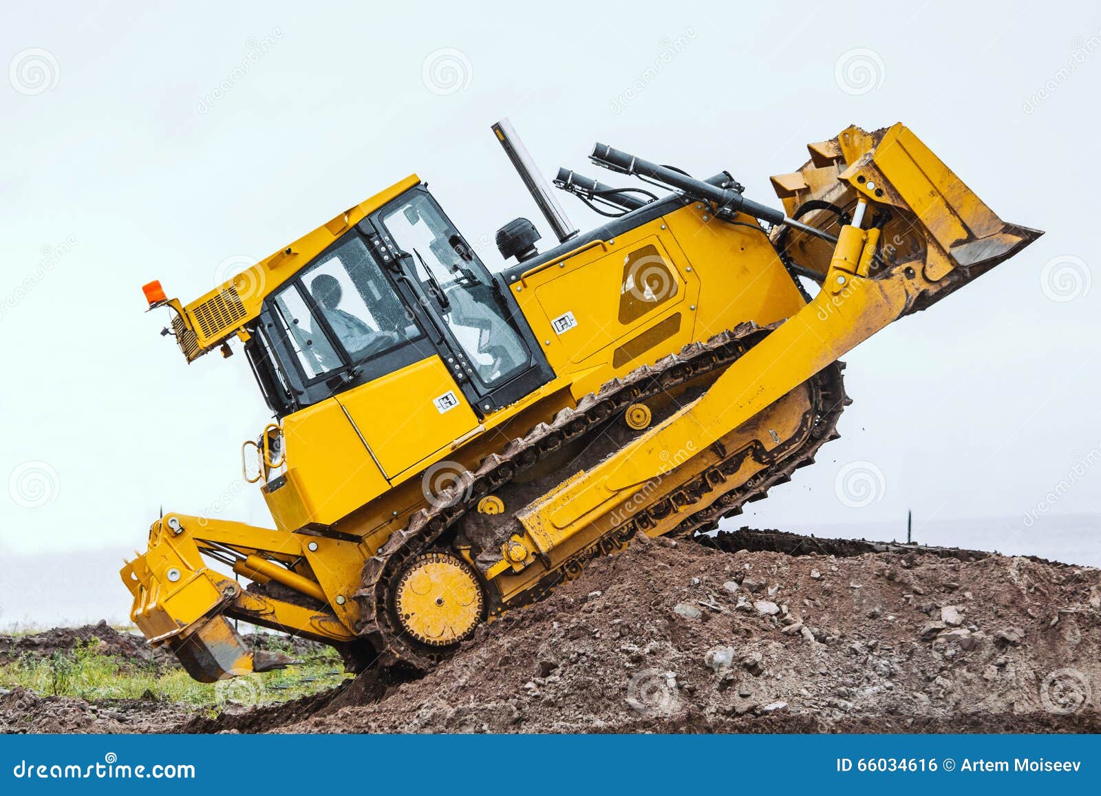 Yellow Bulldozer Overcome Barrier Stock Photo - Image of ground ...