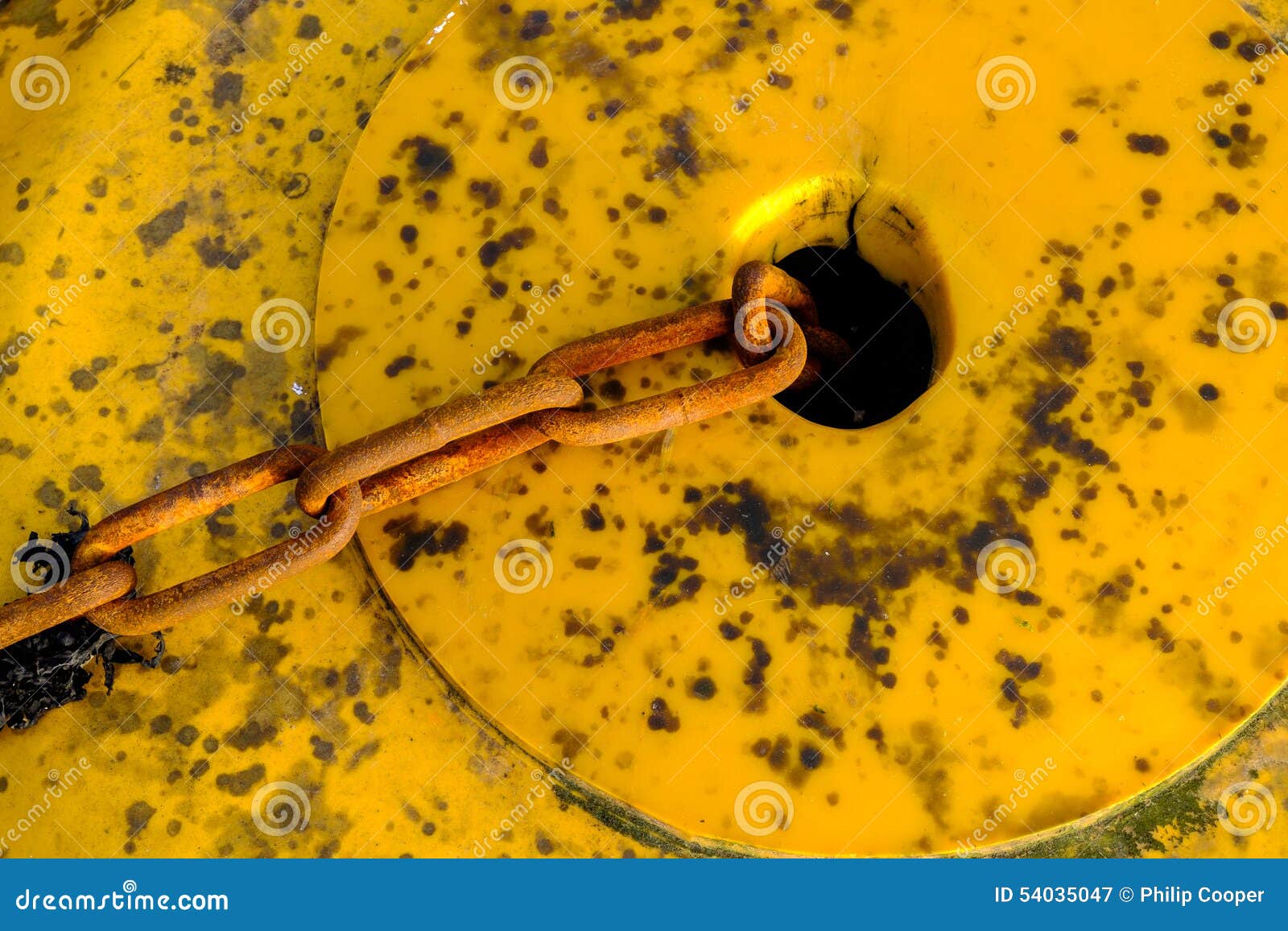 Yellow Buoy with Rusting Chain Stock Image - Image of color, rust: 54035047