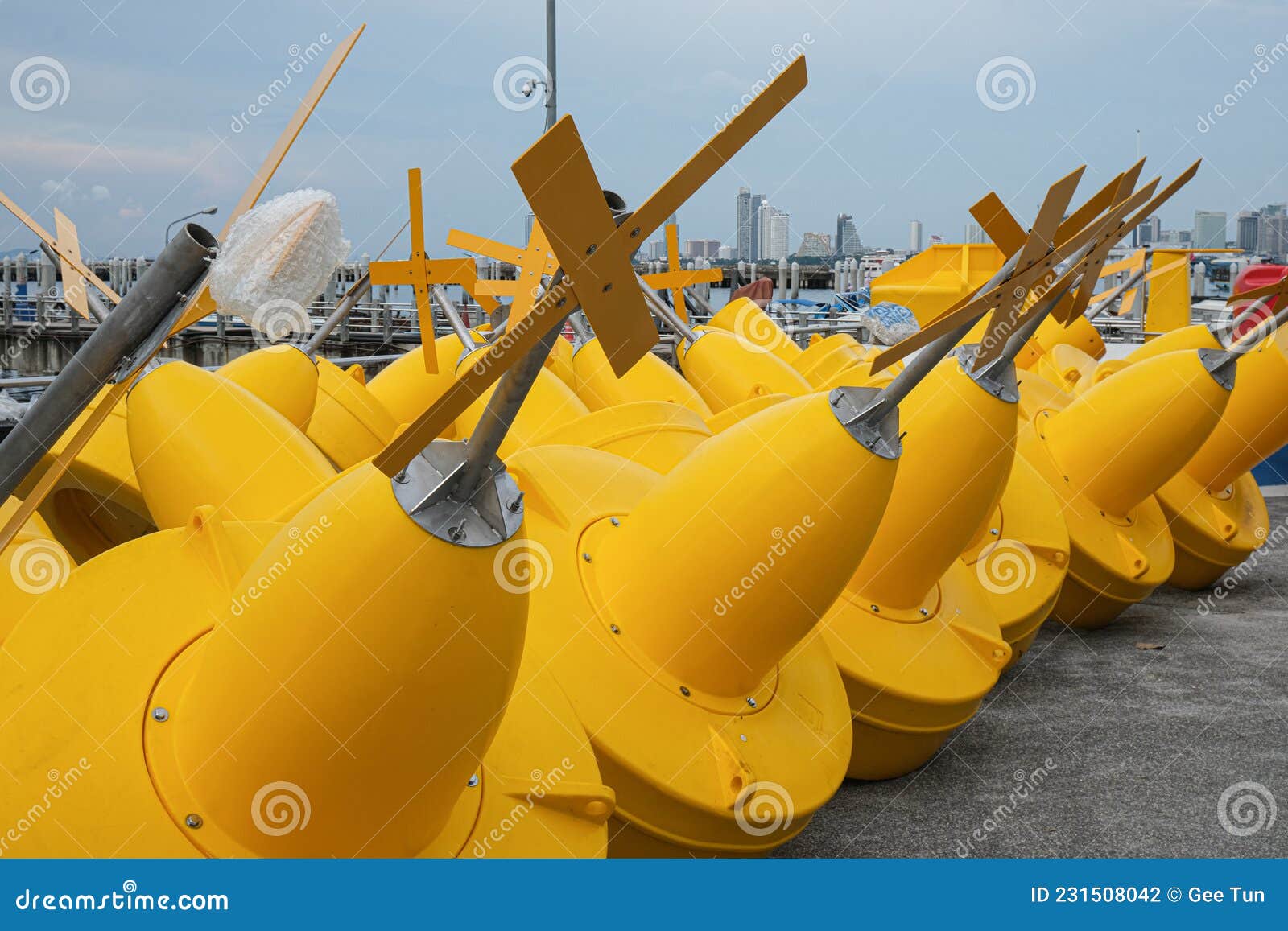 Yellow buoys at a port stock photo. Image of weather - 231508042