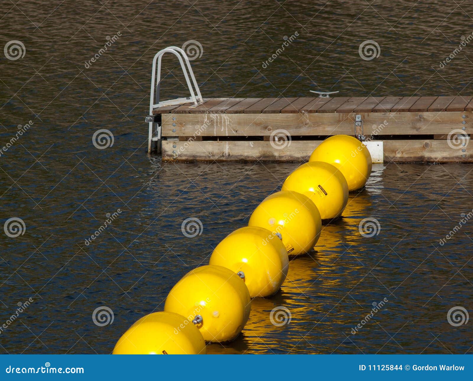 Yellow Buoys and Wooden Dock Stock Photo - Image of float, navigation ...