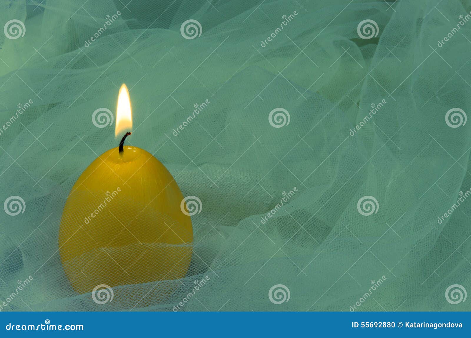 Yellow burning candle stock photo. Image of light, symbol - 55692880