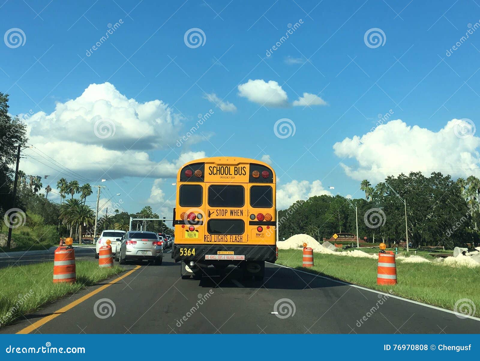 Yellow bus and blue sky editorial stock photo. Image of exit - 76970808