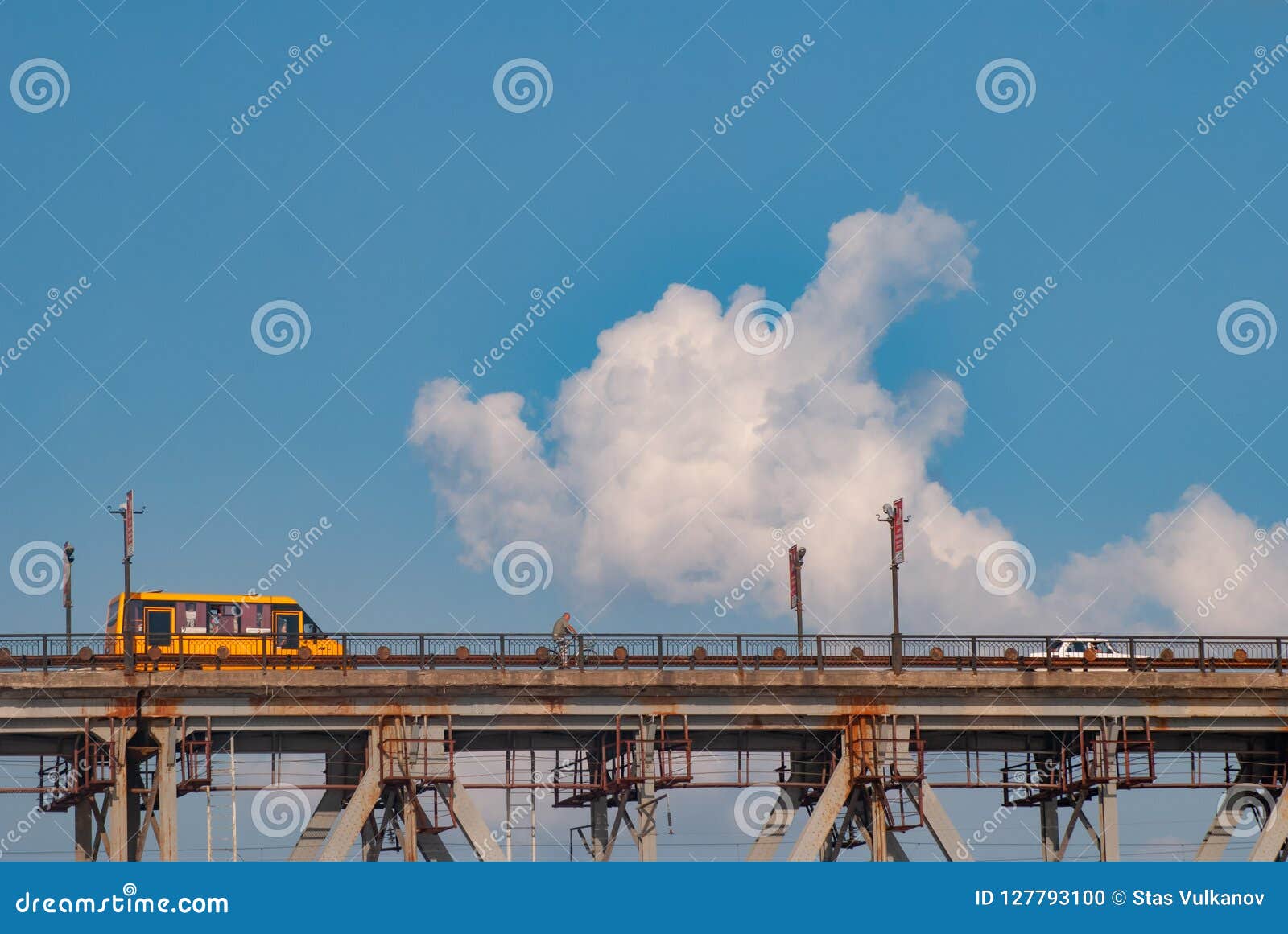 Yellow Bus Rides on the Bridge, School Bus on the Sky Background, Stock ...