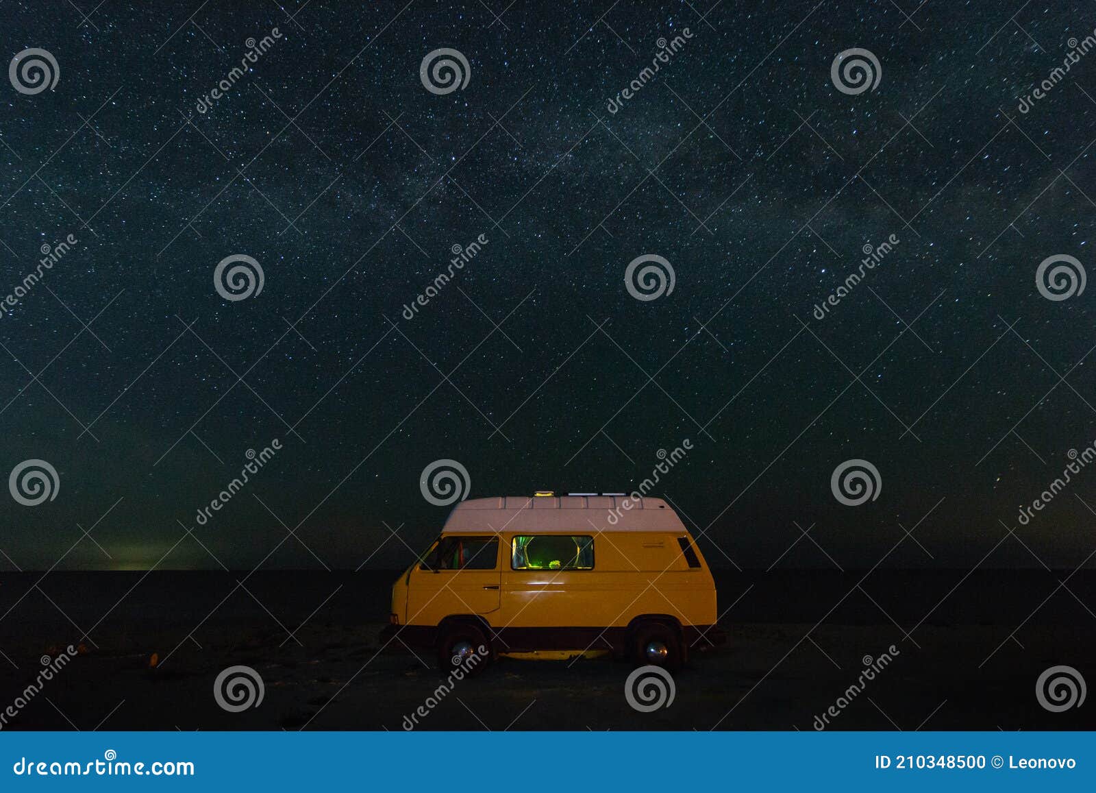 Yellow Camper Van at Night Parking Under the Starry Sky Stock Photo ...