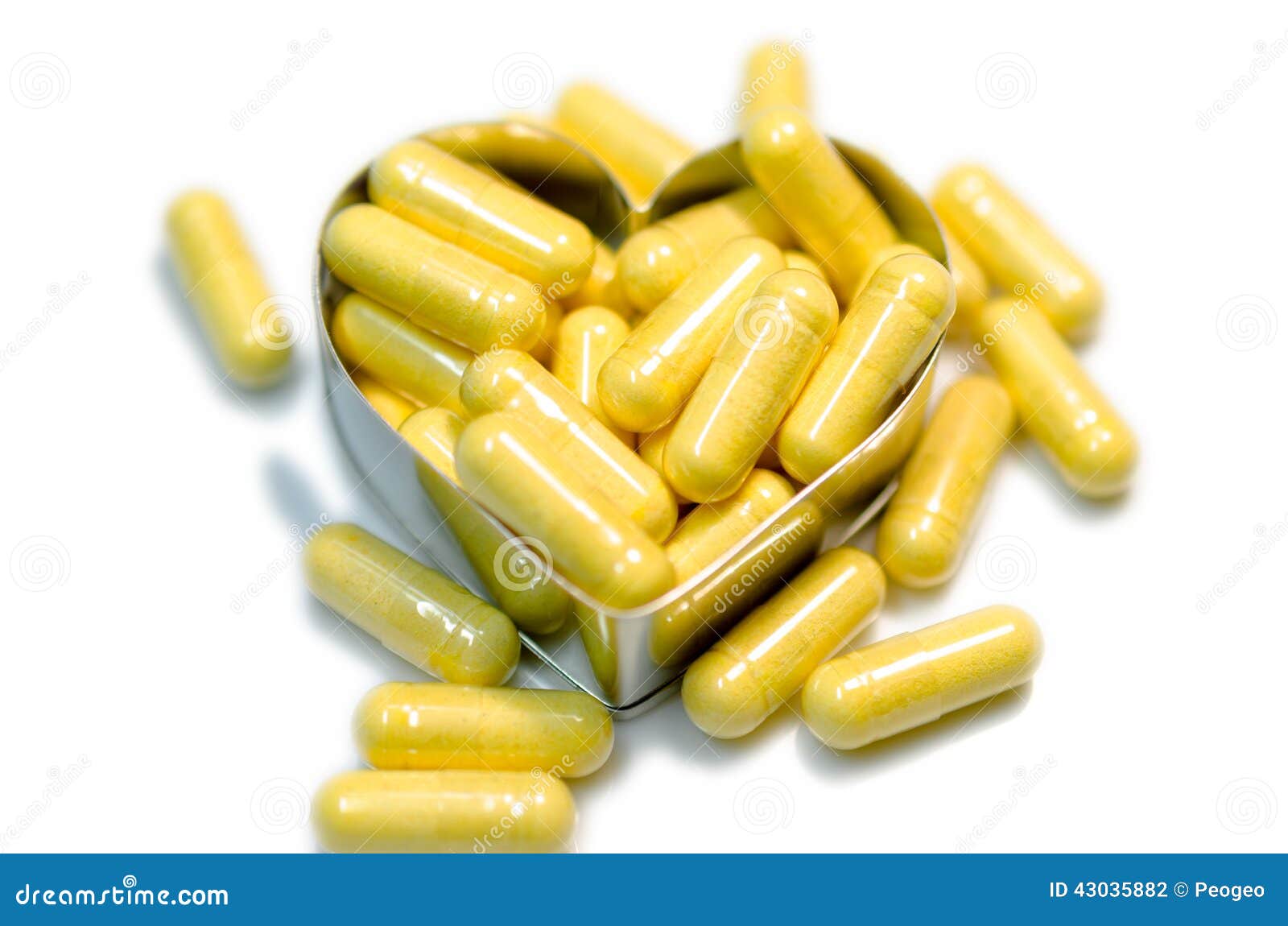 Yellow capsule heart stock photo. Image of healthcare - 43035882