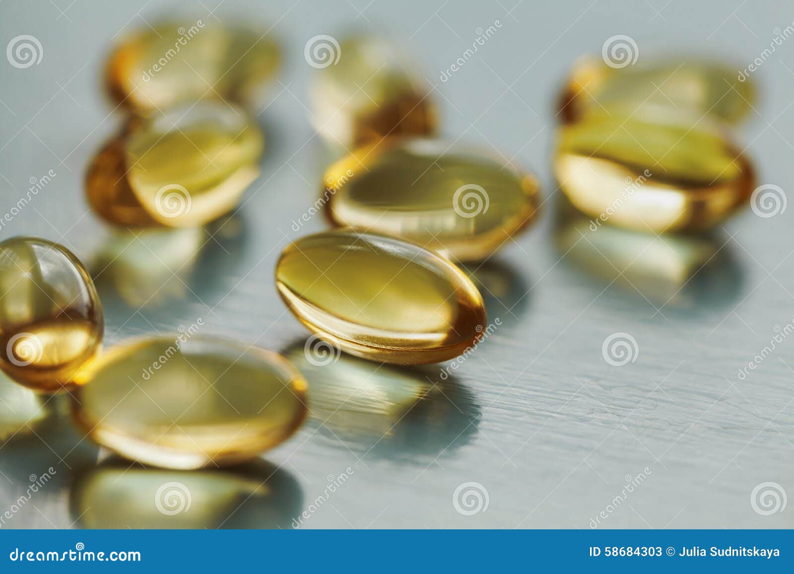 Yellow Capsule with Vitamin E Tocopherol on Blue Surface Stock Image ...