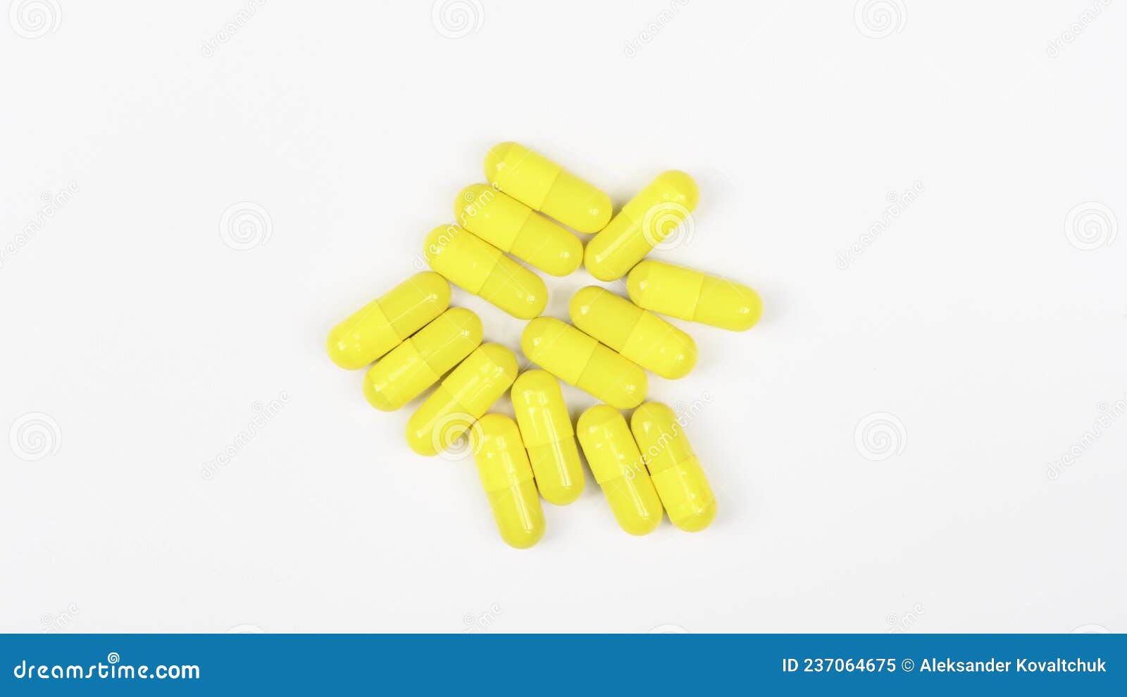 Yellow Capsules on White Background. Top View. Loop Motion. Rotation ...