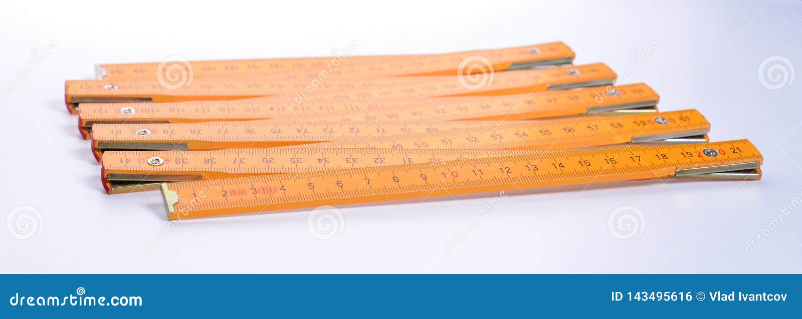 Yellow Carpenter`s Ruler Stock Photo | CartoonDealer.com #143495616