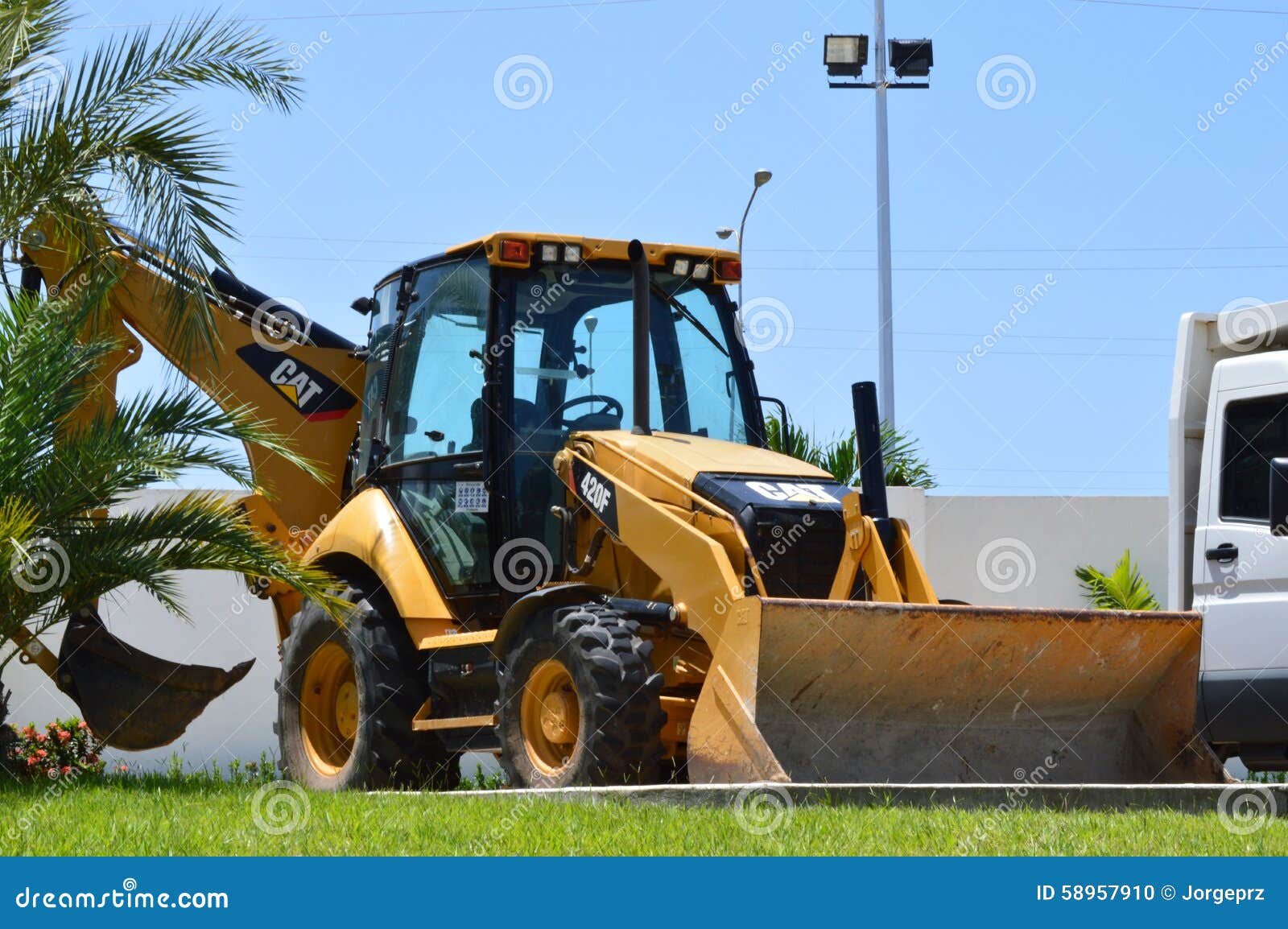 Yellow Caterpillar tractor editorial image. Image of earthwork - 58957910