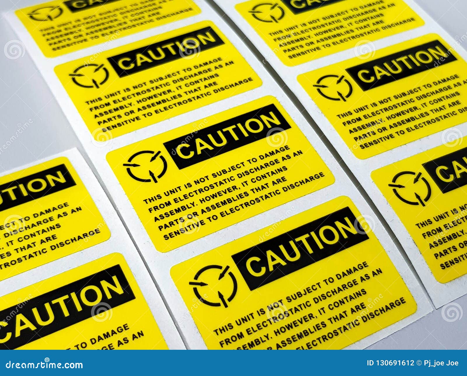 Yellow Caution Label,Standard Caution Label with Text Stock Photo ...